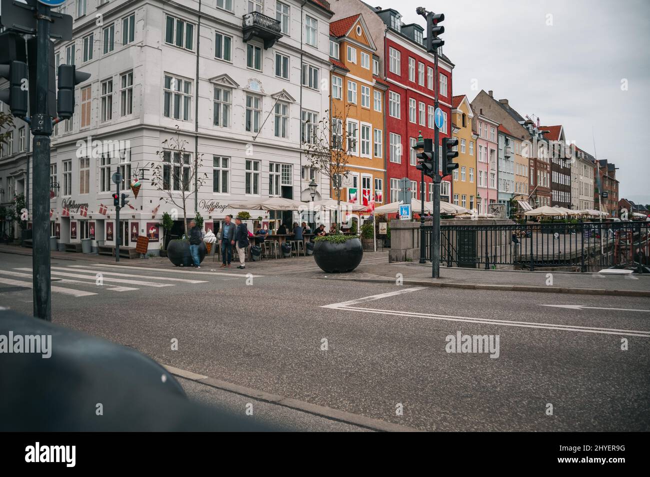 Peaceful street in Nyhavn with colorful facades of old houses Stock ...