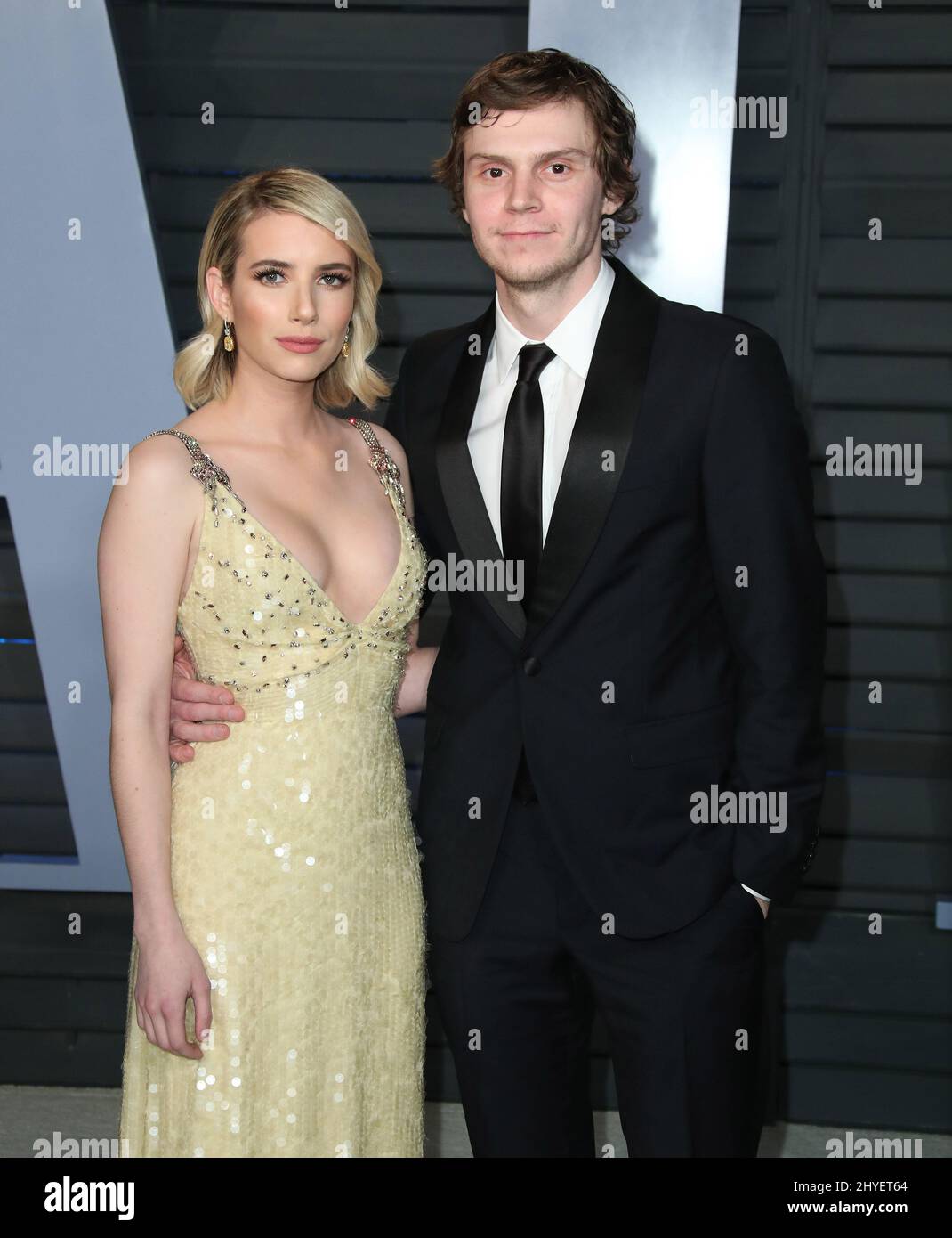 Emma Roberts and Evan Peters attending the Vanity Fair Oscar Party held ...