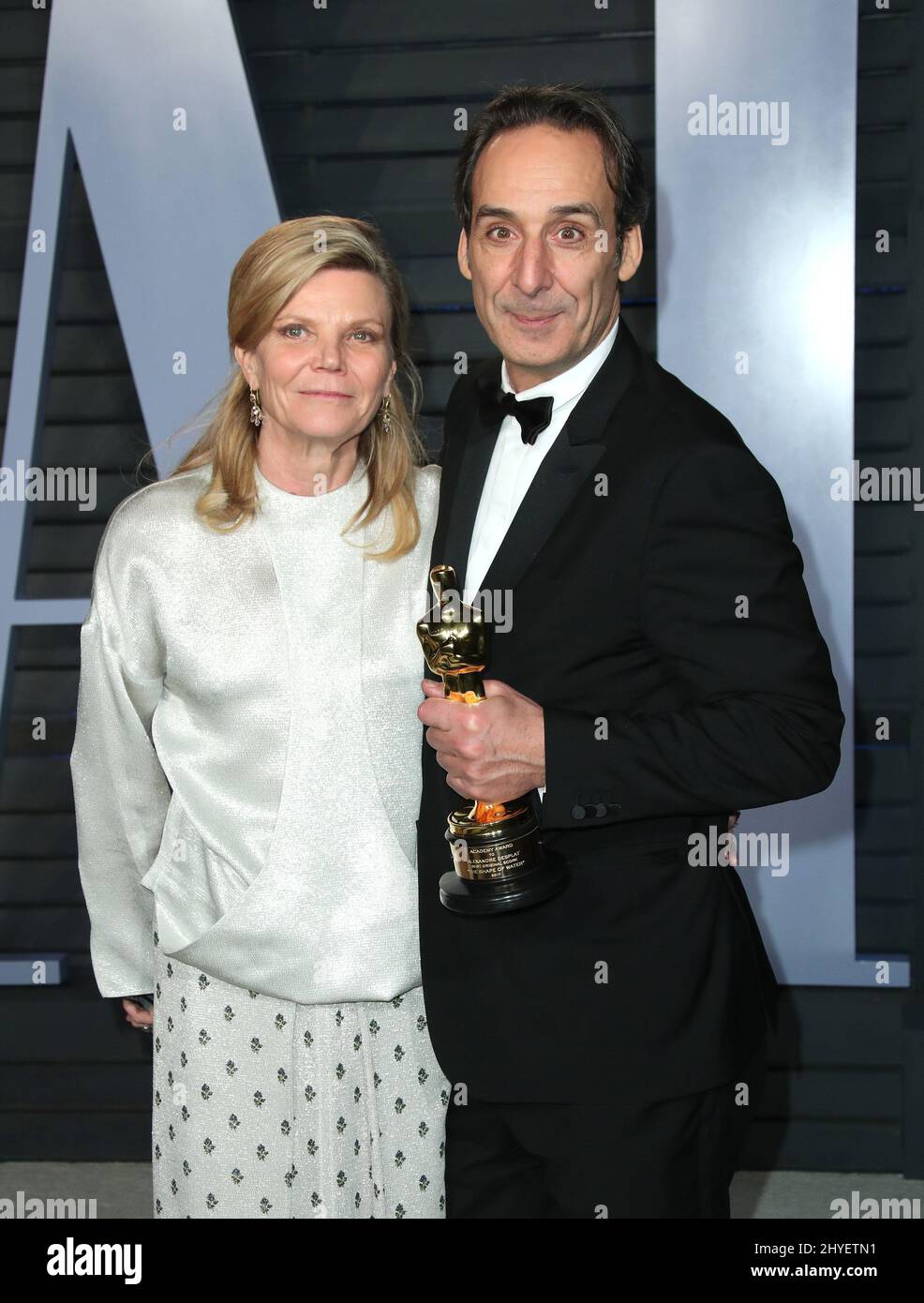 Alexandre Desplat and Dominique Lemonnier attending the Vanity Fair ...