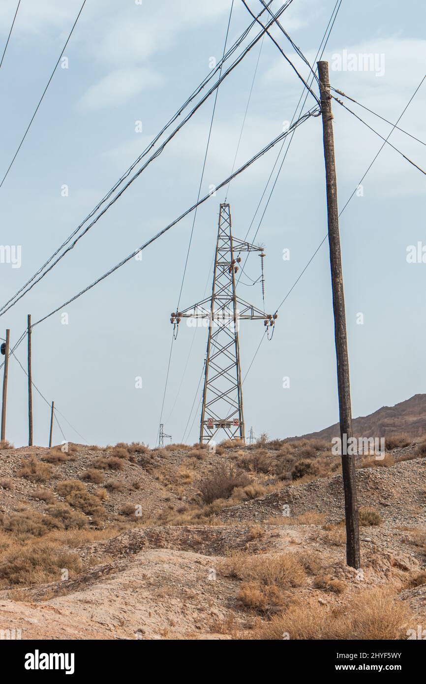 Vertical shot of high voltage transmission tower Stock Photo - Alamy