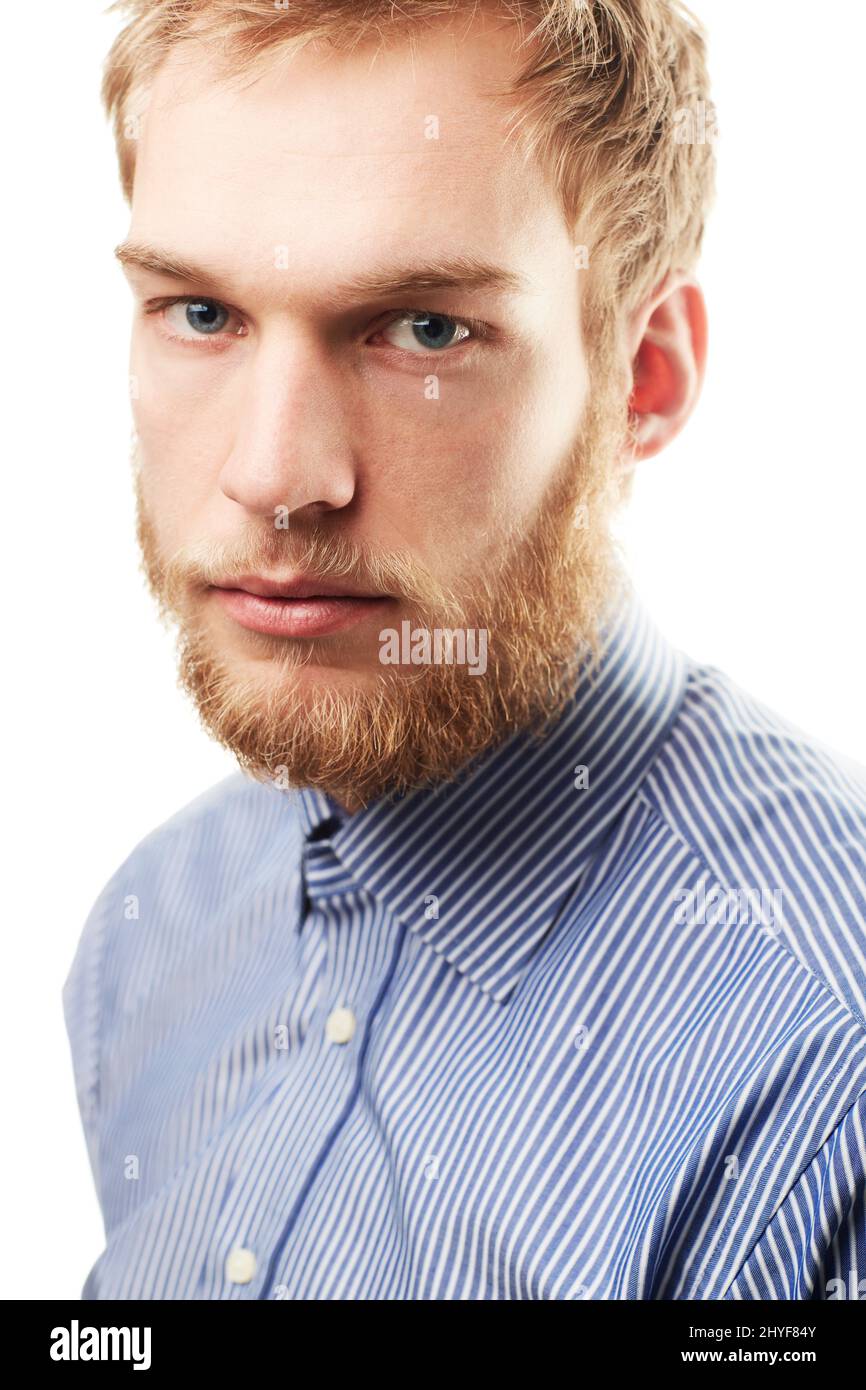 Rugged confidence. Portrait of an unshaven young man isolated on white ...