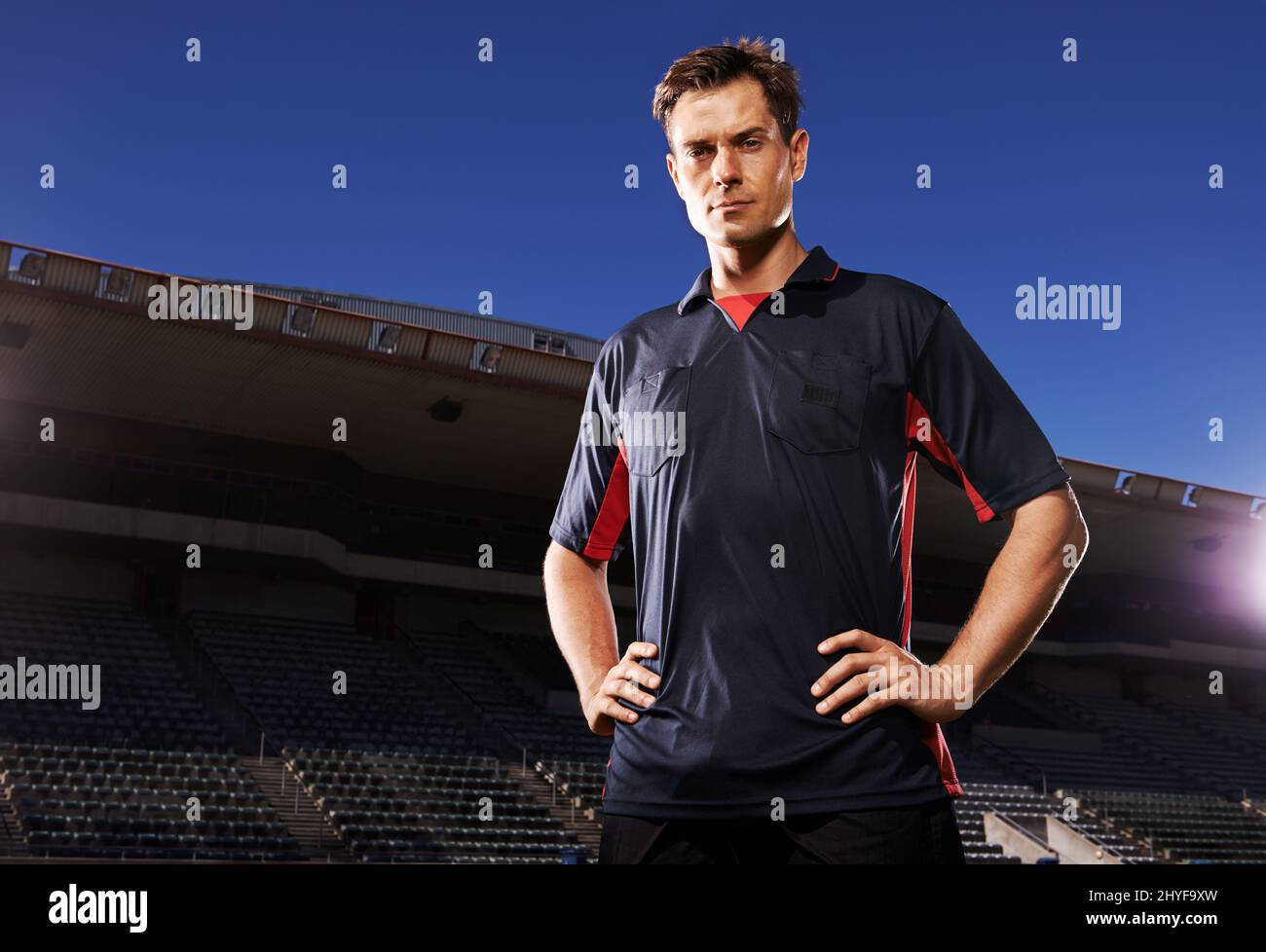 Man standing alone in stadium hi-res stock photography and images - Alamy