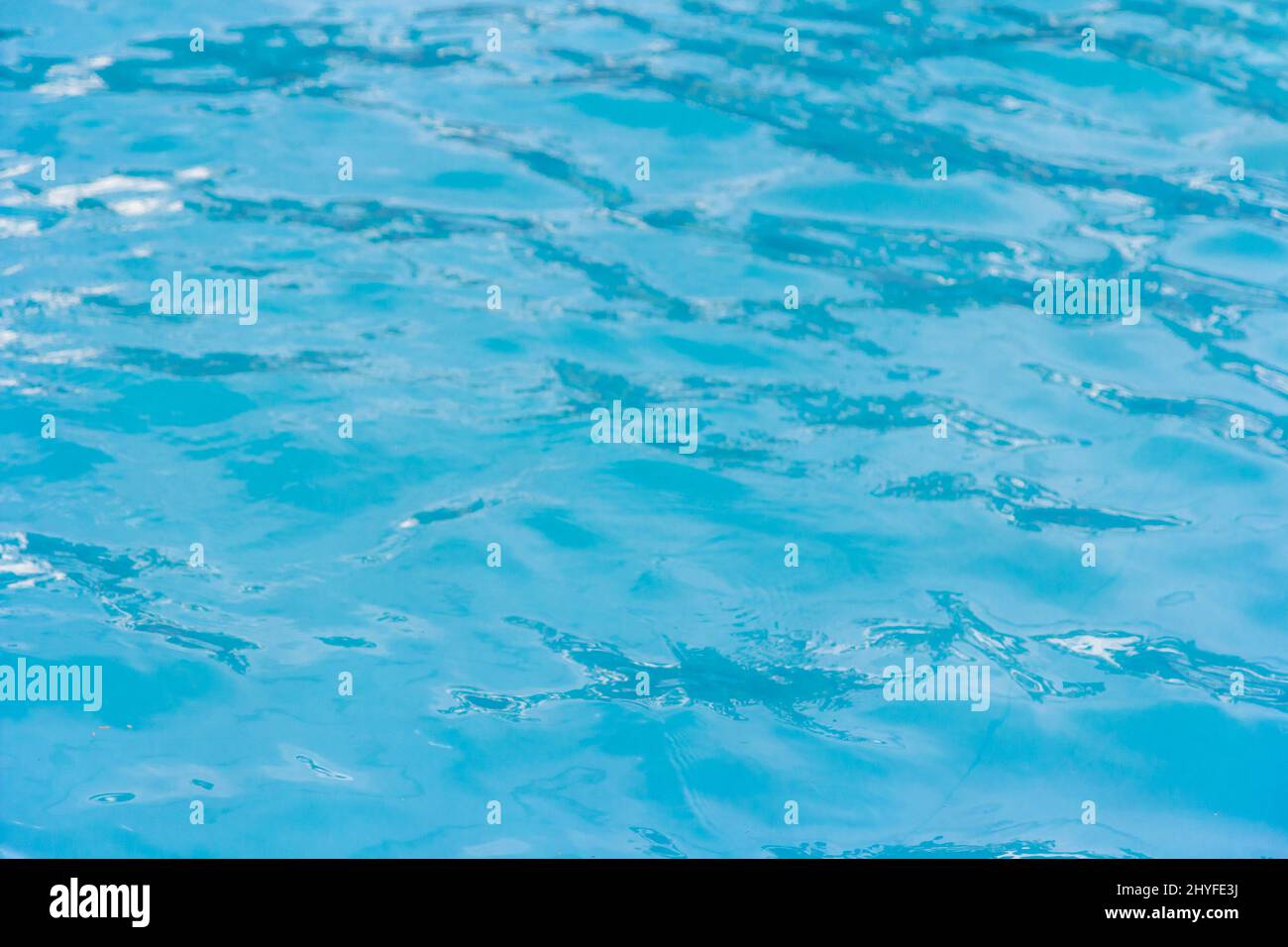 Pool Blue water reflection texture background Stock Photo - Alamy