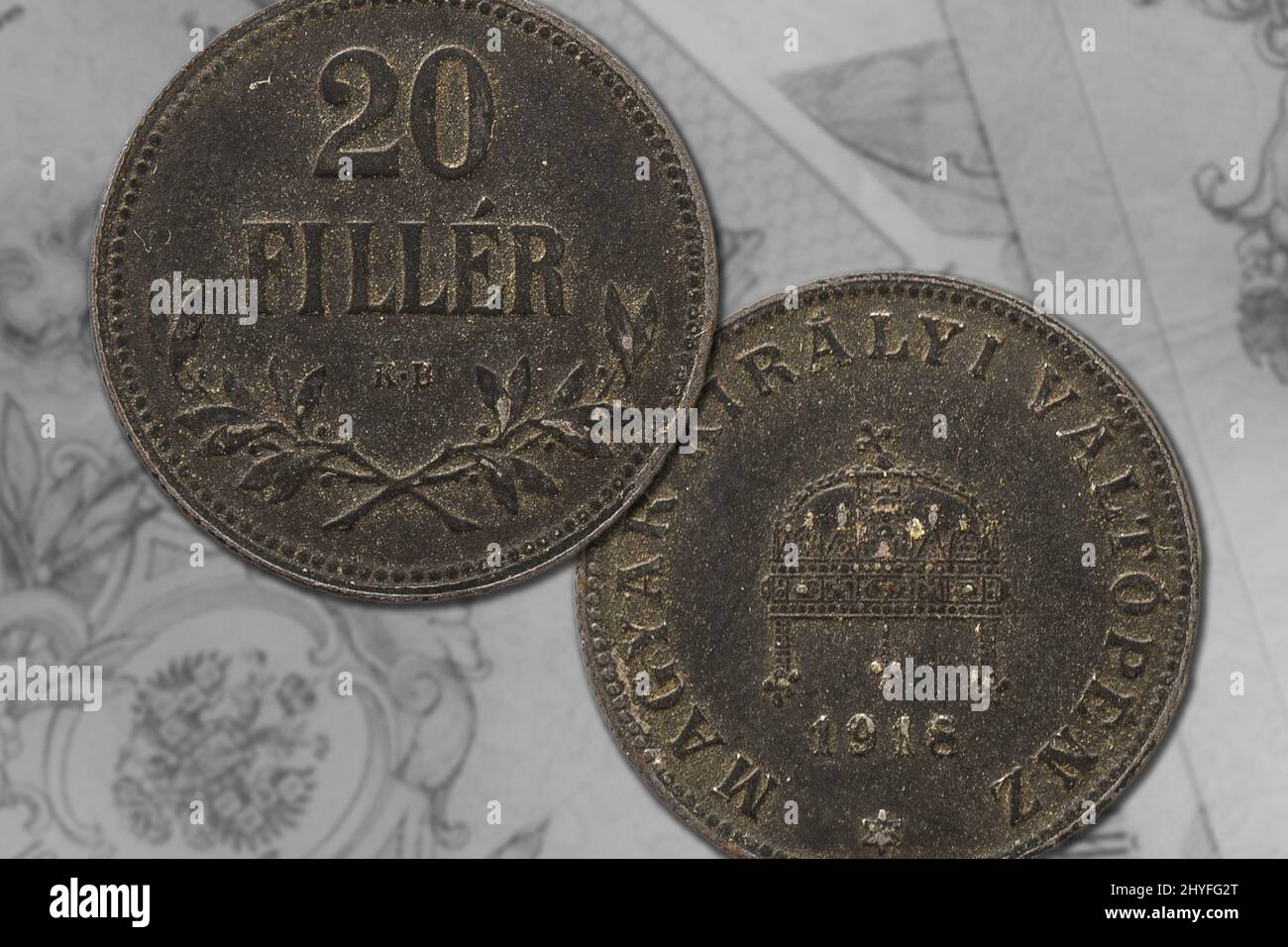Vintage Austro-Hungarian empire 20 filler coins from 1916 on a paper ...