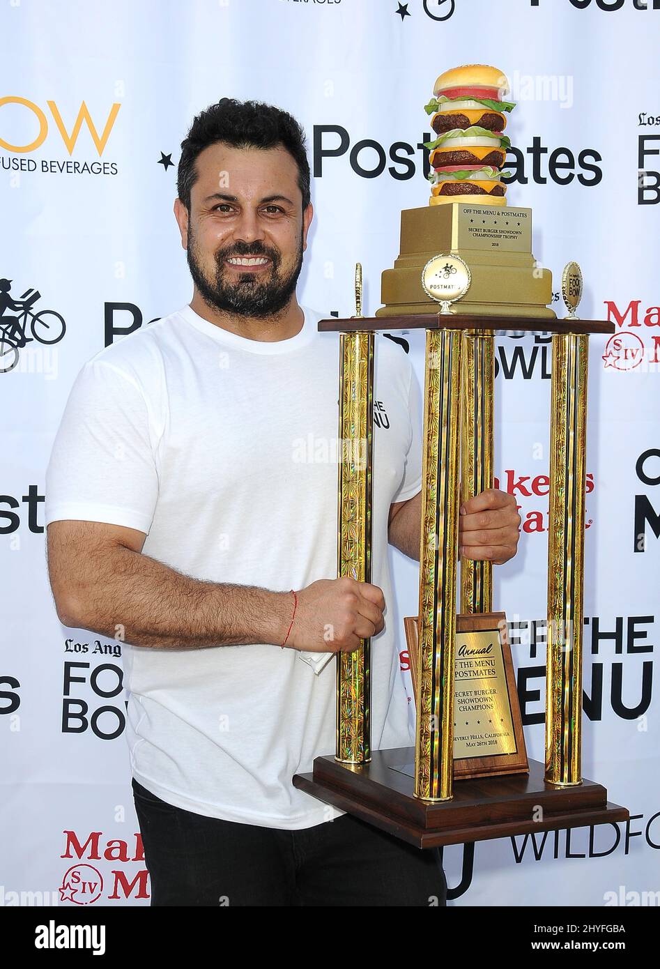 Lawrence Longo participates at the Off the Menu and Postmates city's ...