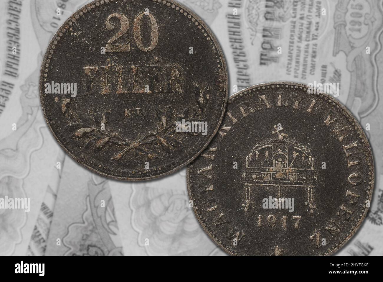 Vintage Austro-Hungarian empire 20 filler coins from 1916 on a paper ...