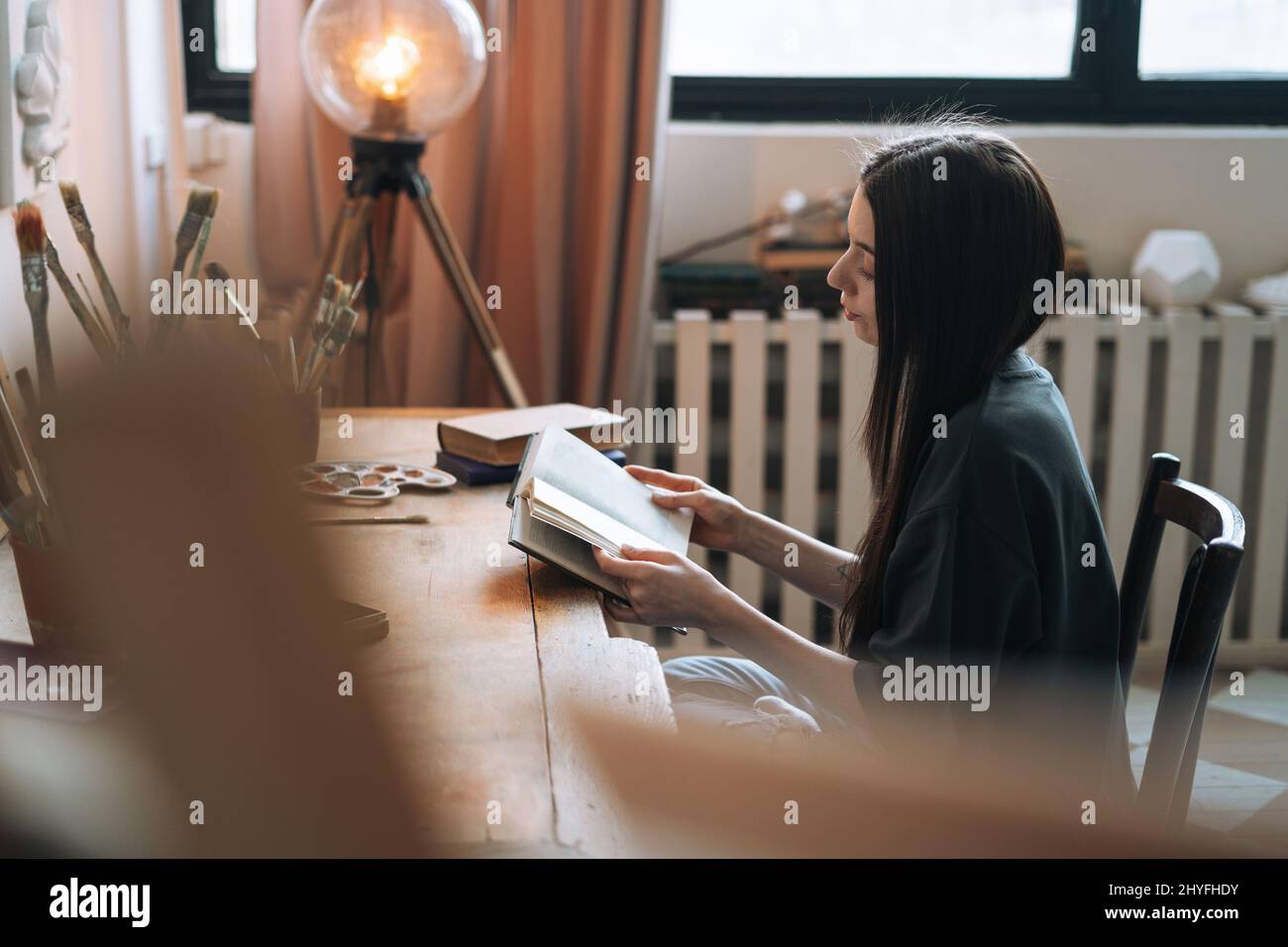 Young smiling woman teenager girl student with dark long hair in casual ...