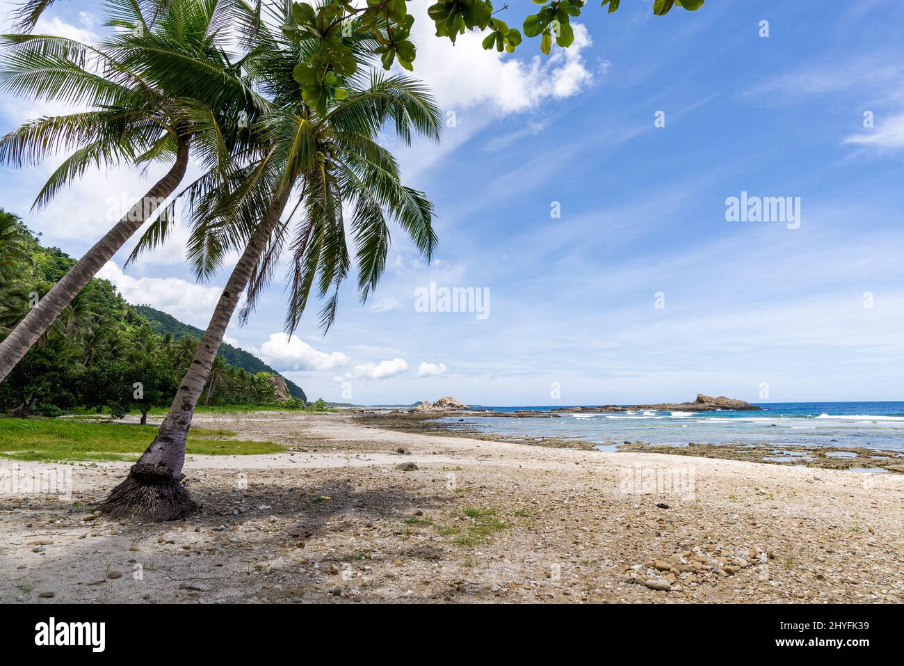 Wooden signboard on a beach next to sSthe sunny day in Rakit dakit ...