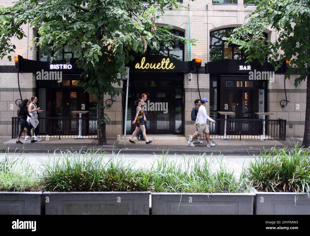 People walking in the street of Vancouver, British Columbia, Canada ...