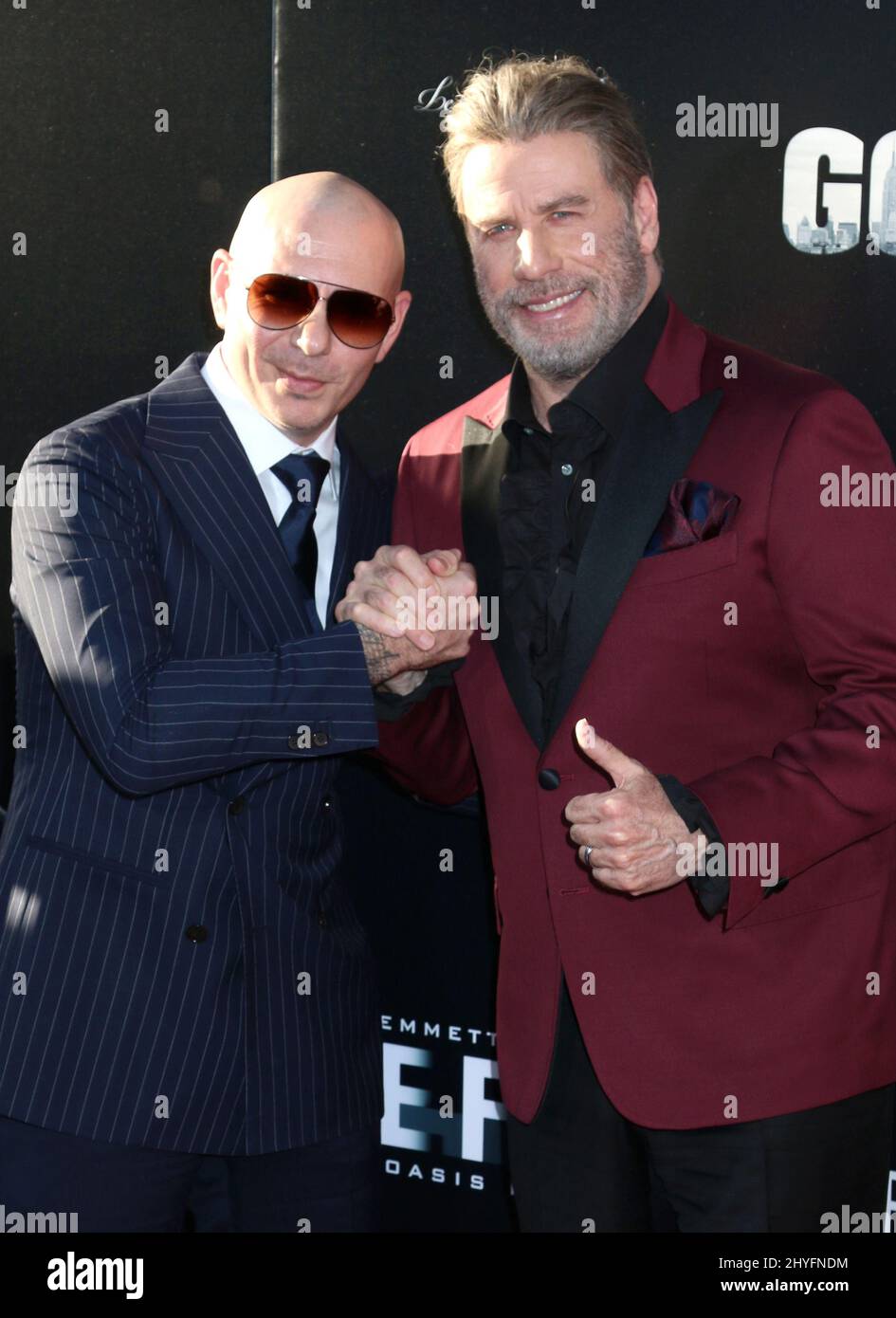 Pitbull & John Travolta attending the Gotti Premiere held at the SVA ...