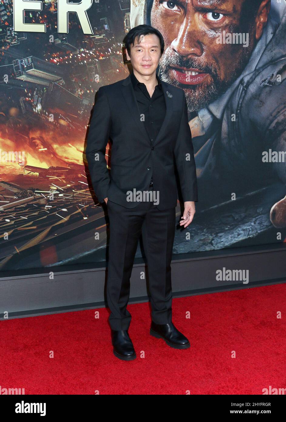 Ng Chin Han attending the Skyscraper New York Premiere held at the AMC ...