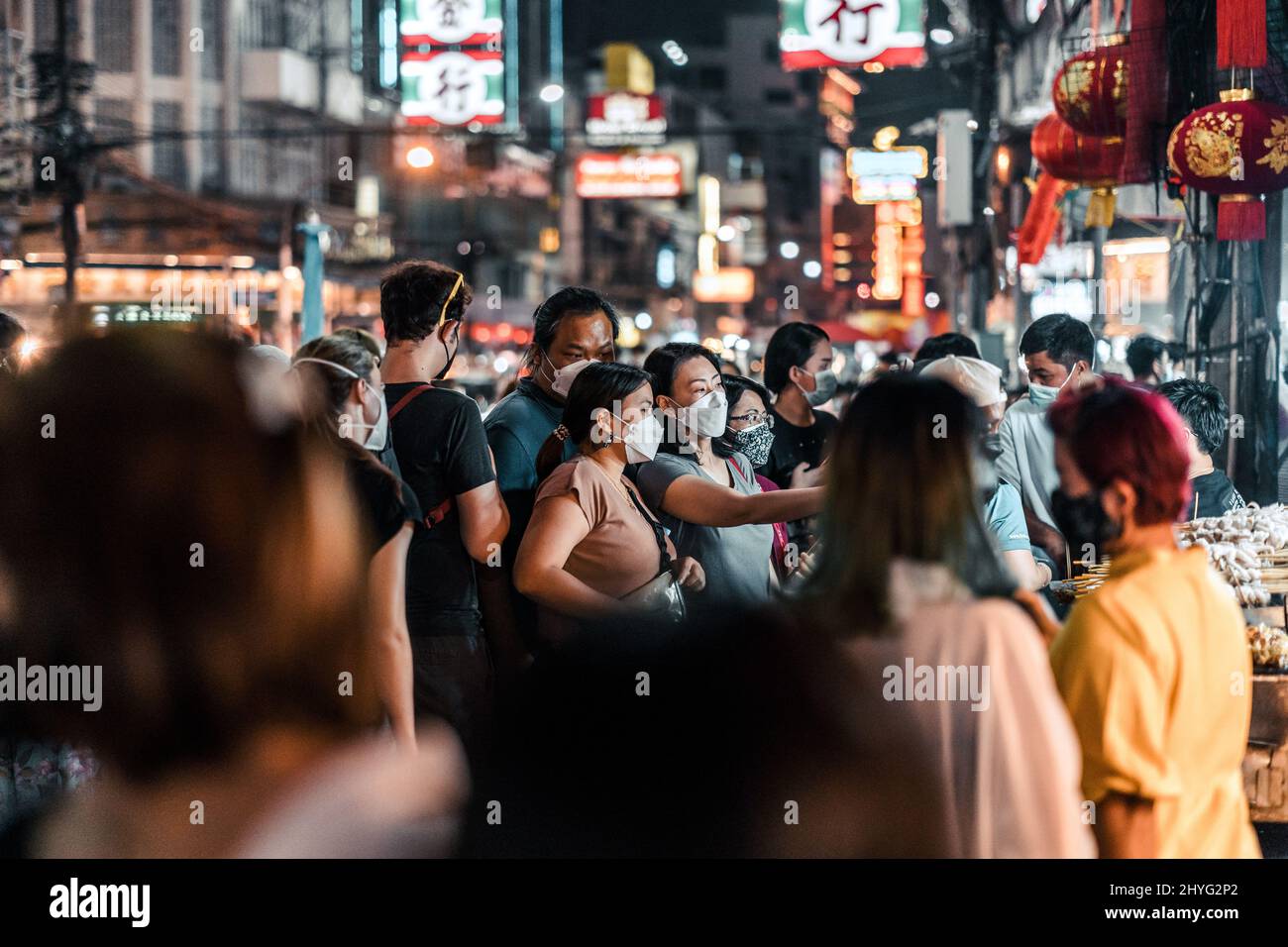 Busy people along the street with many food stalls at China Town in ...