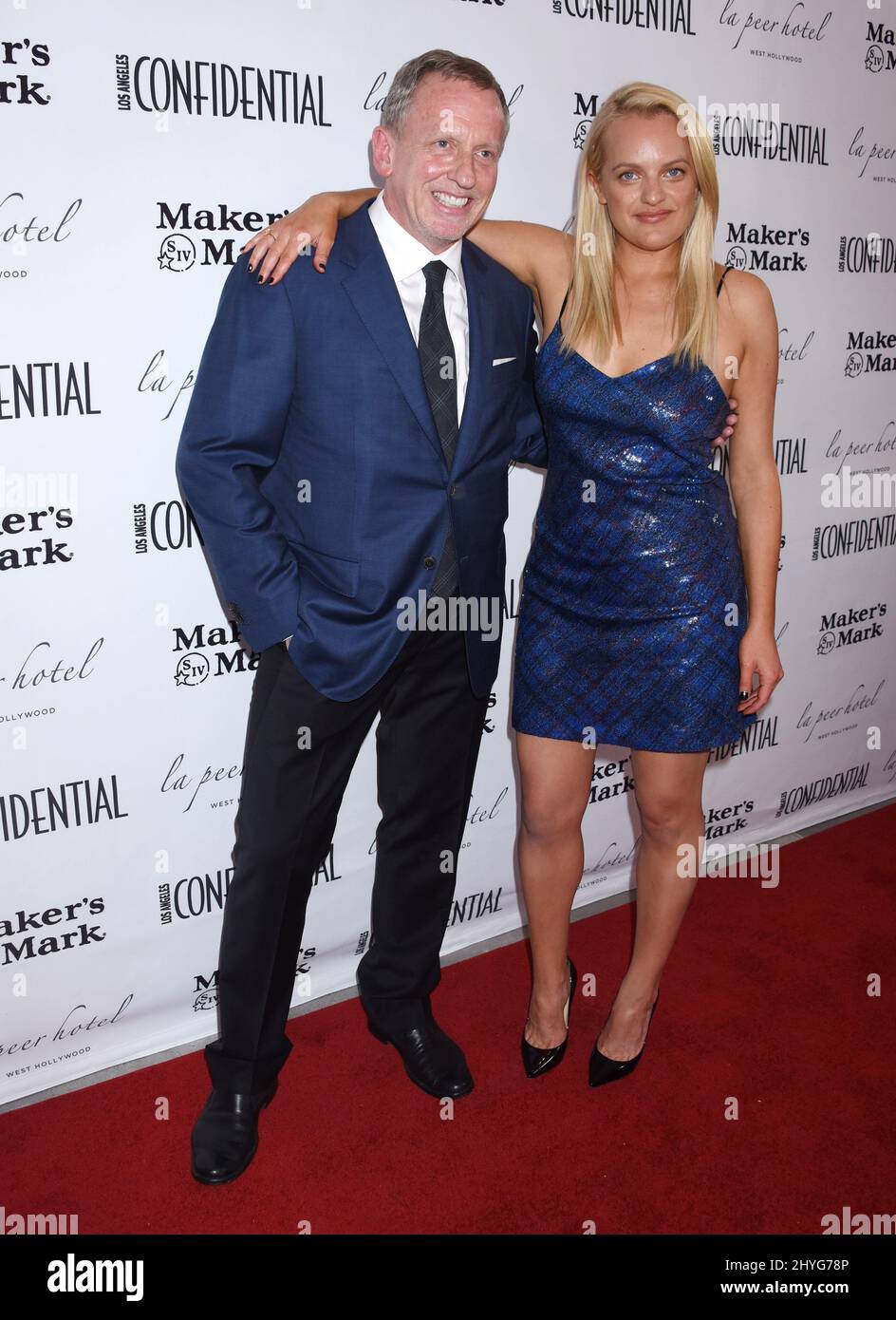 Spencer Beck and Elisabeth Moss at Los Angeles Confidential and ...