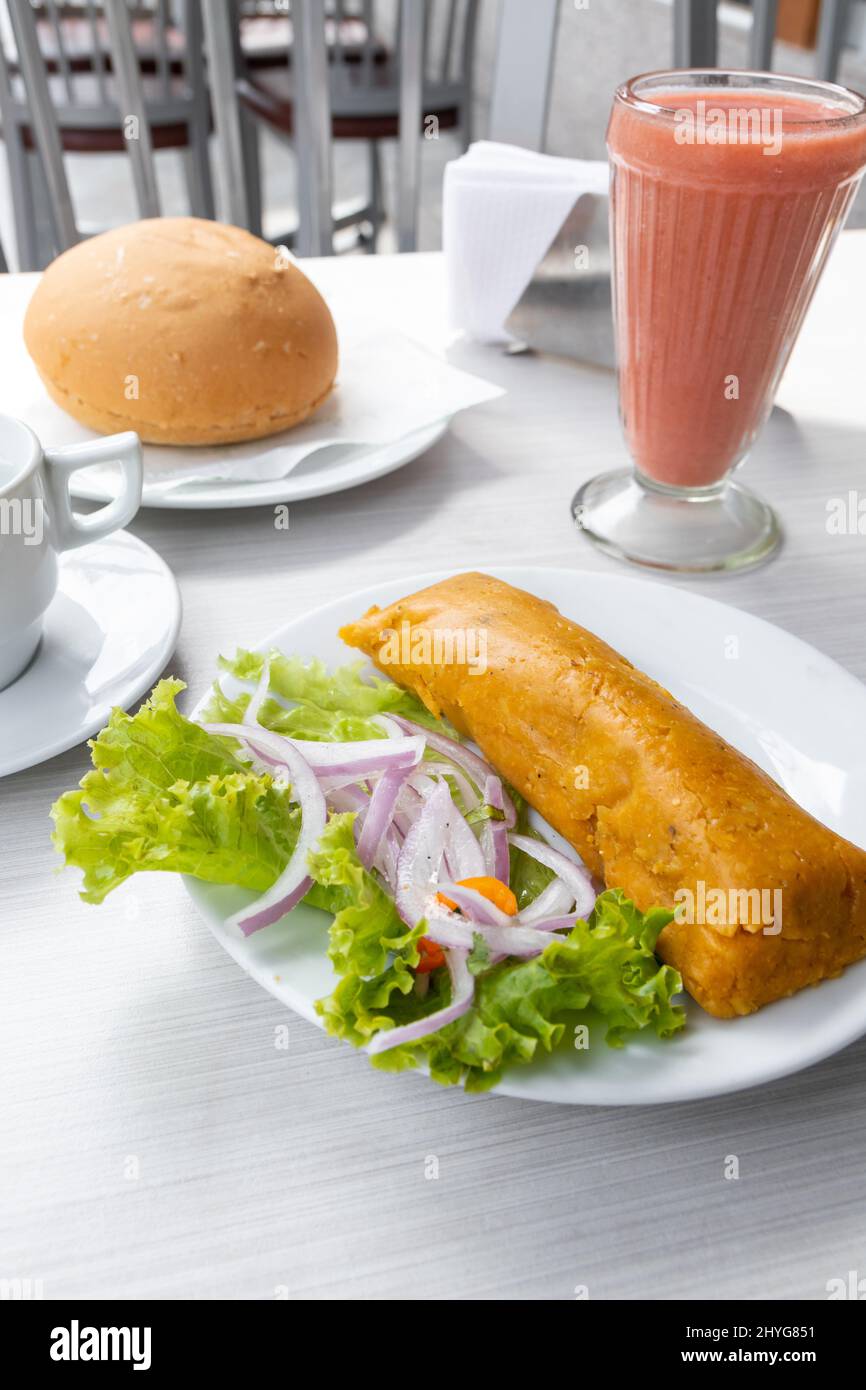 Breakfast table with salad and cocktail in a cafe Stock Photo - Alamy