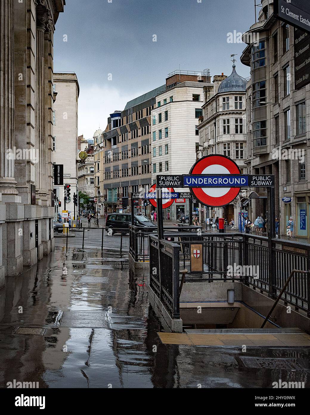 Buildings and the underground signs on a rainy day in London Stock ...