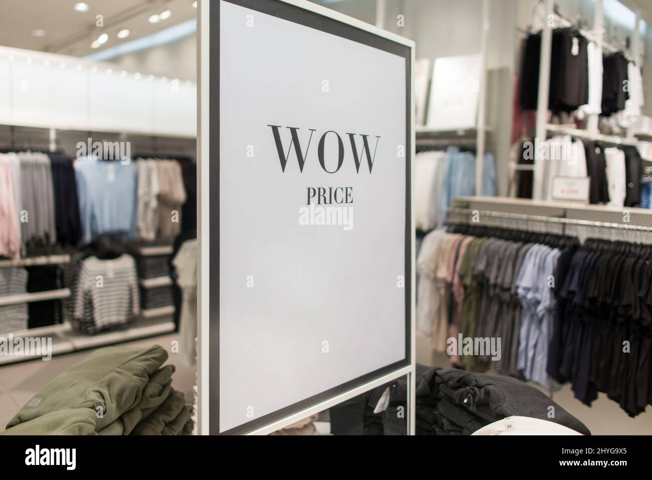 Sale poster, Clothing store, discount sign showcase Stock Photo - Alamy