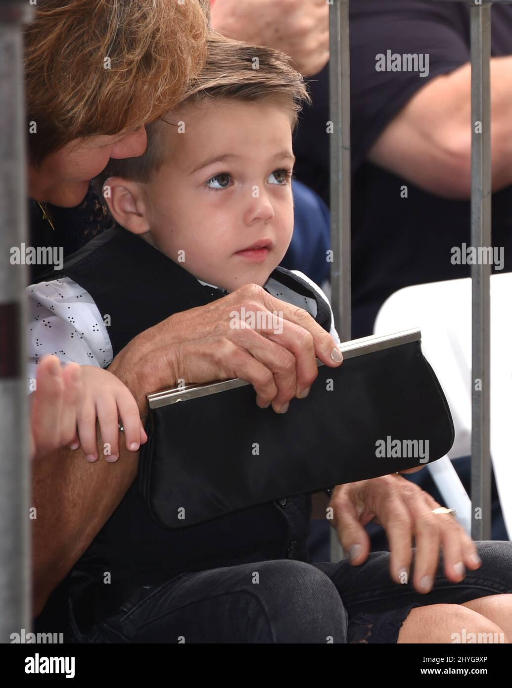 Isaiah Michael Fisher attending Carrie Underwood's Hollywood Walk of ...