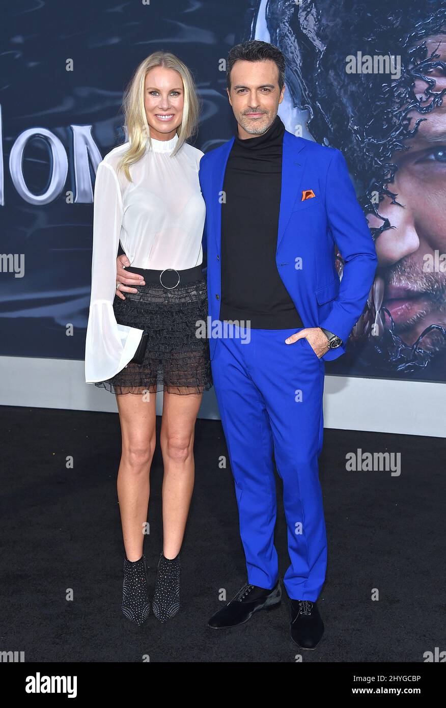 Reid Scott and Elspeth Keller arriving for the "Venom" premiere held at ...