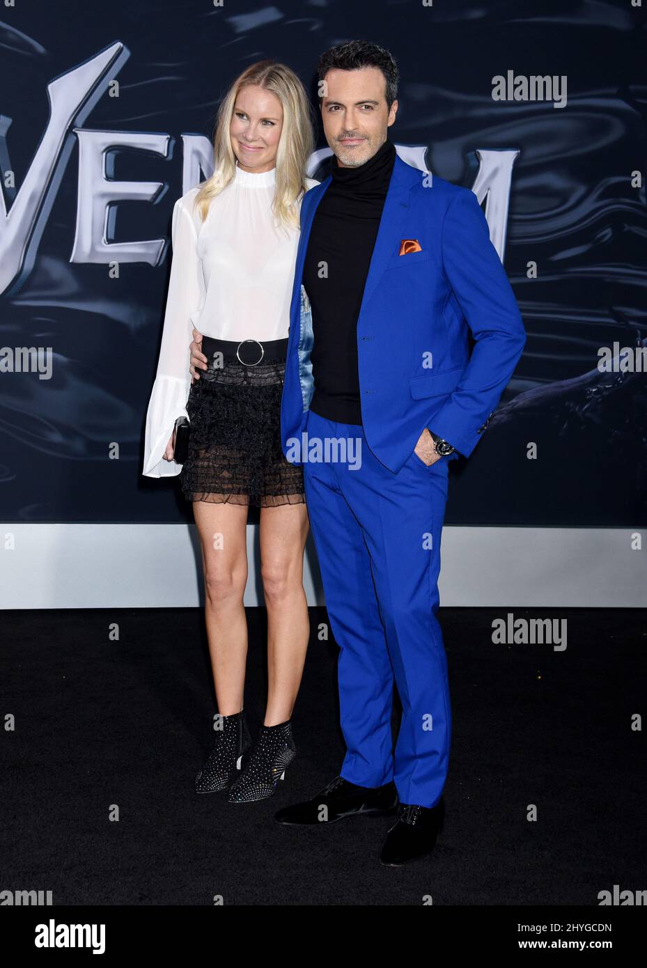 Reid Scott and Elspeth Scott arriving for the "Venom" premiere held at ...