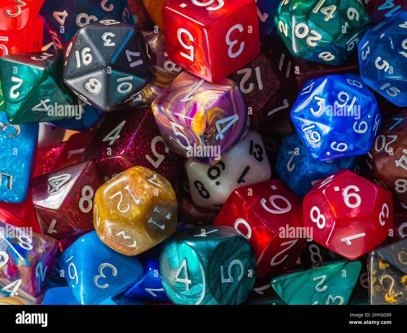 Bunch of colorful dice Stock Photo - Alamy