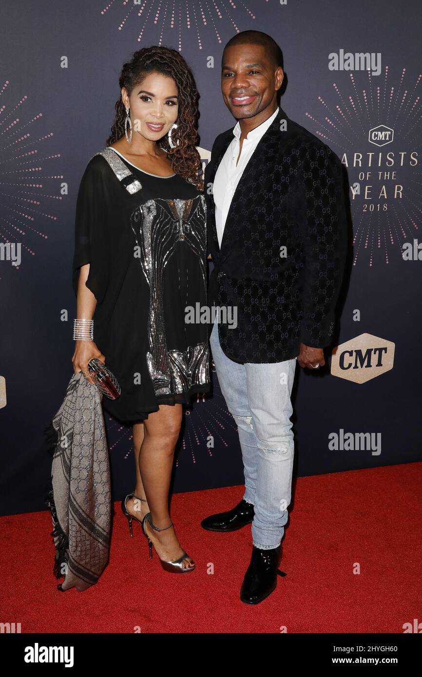 Kirk Franklin and Tammy Collins attending the CMT Artists of the Year ...