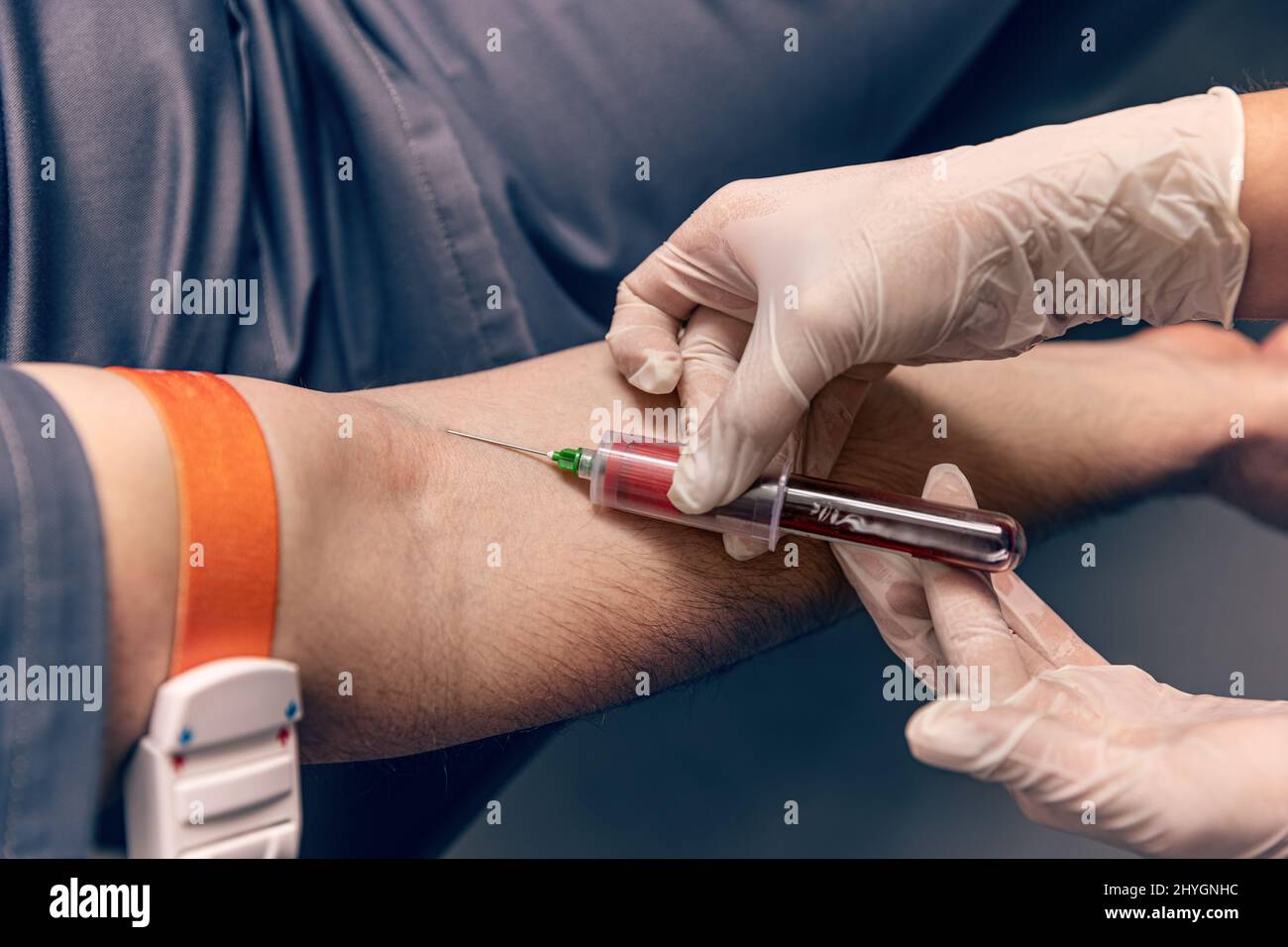 Male patient during blood test sampling procedure Stock Photo - Alamy