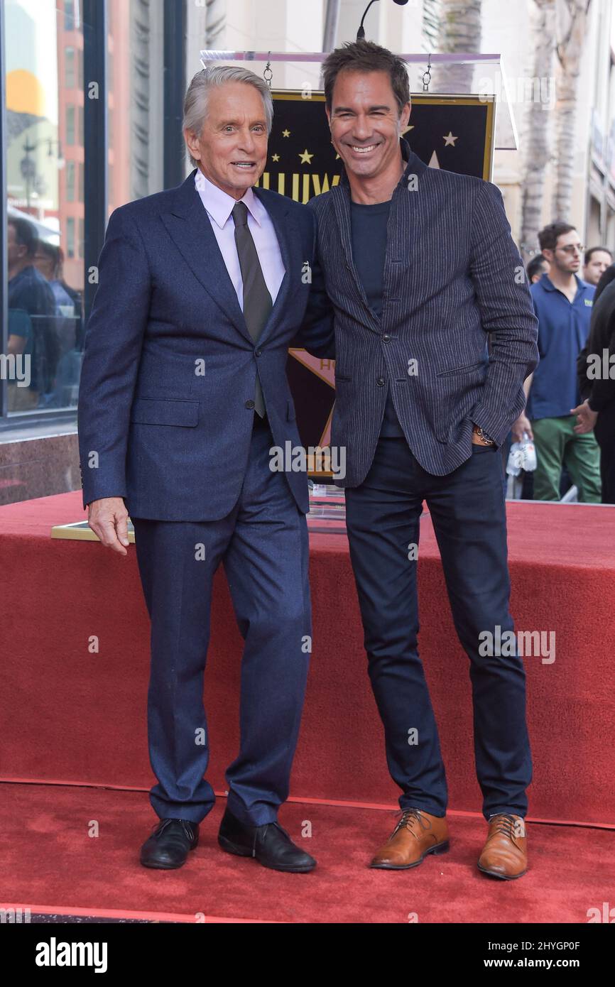 Michael Douglas and Eric McCormack at the Walk of Fame ceremony ...