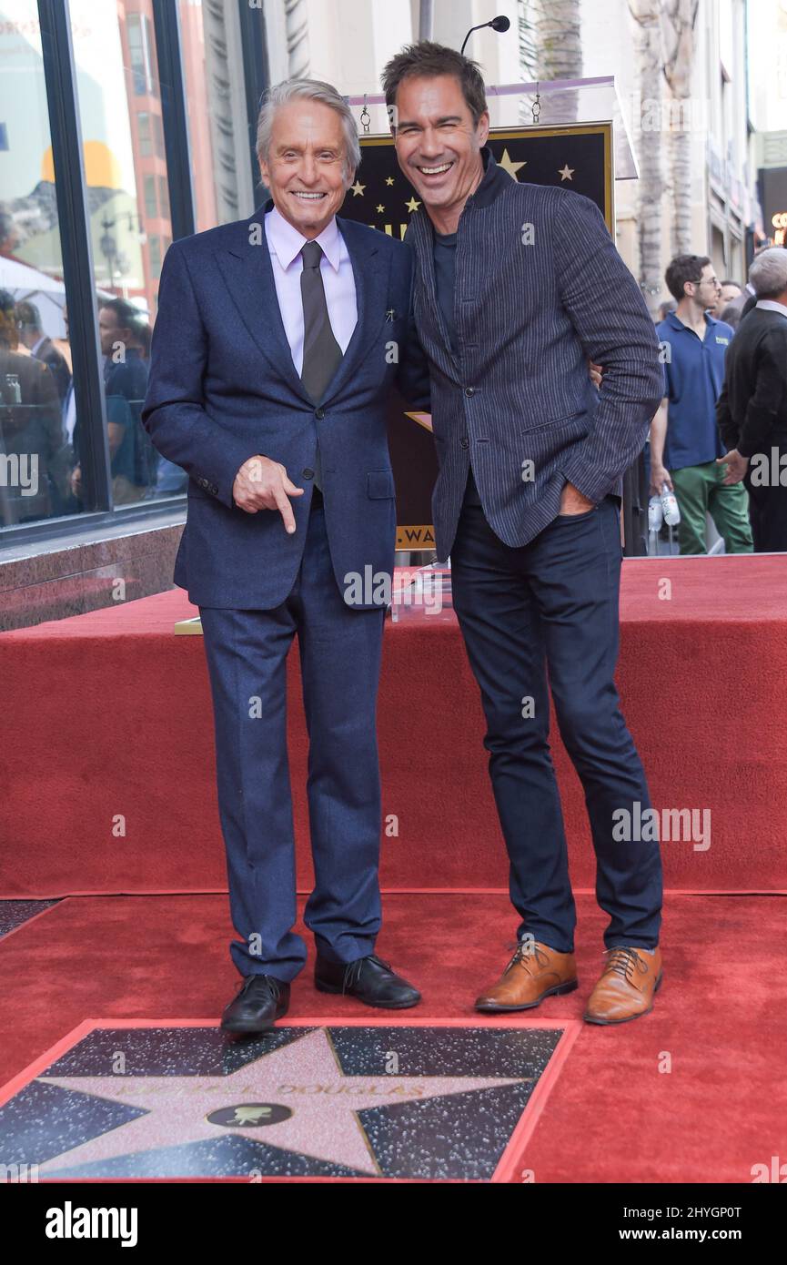 Michael Douglas and Eric McCormack at the Walk of Fame ceremony ...
