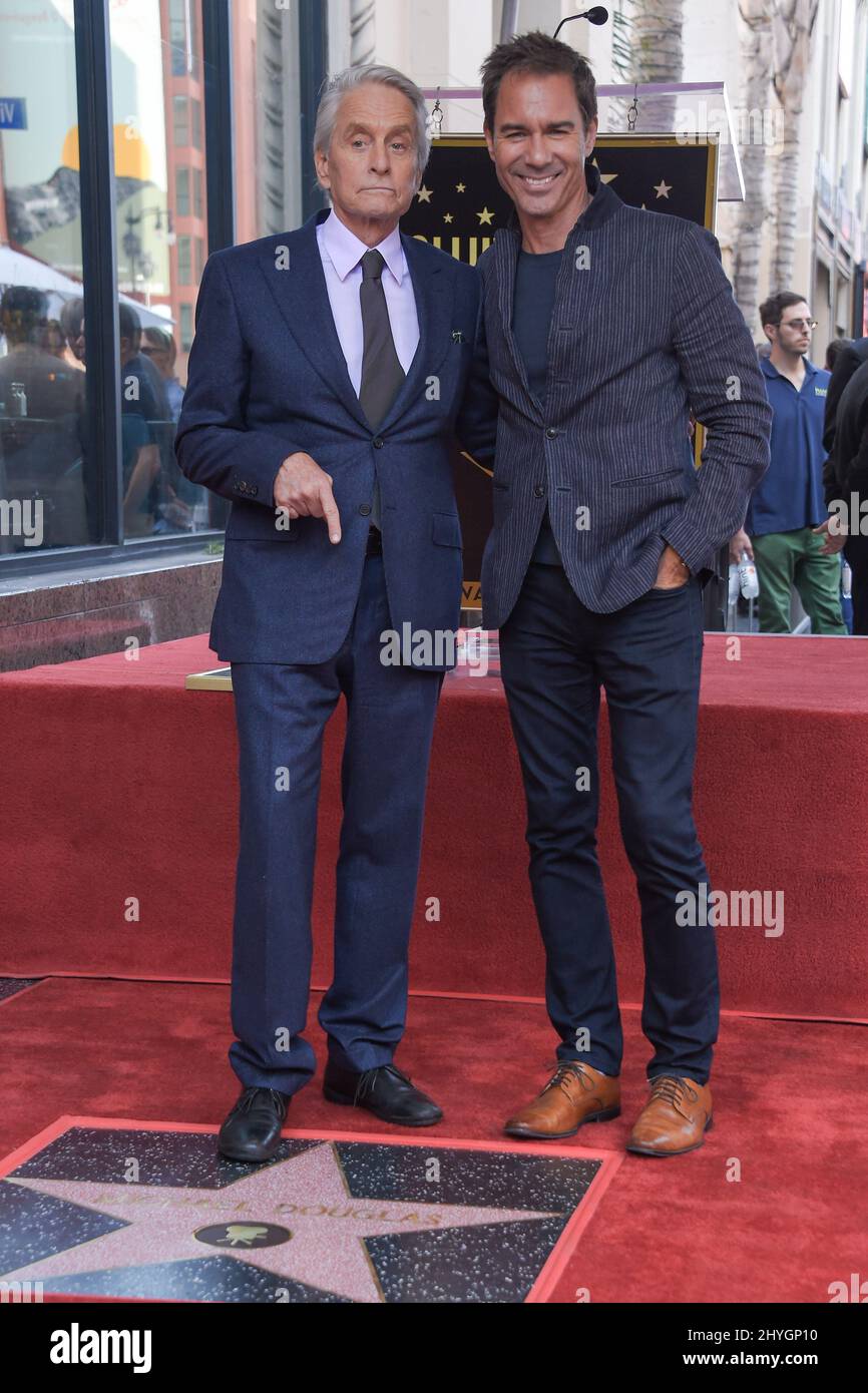 Michael Douglas and Eric McCormack at the Walk of Fame ceremony ...