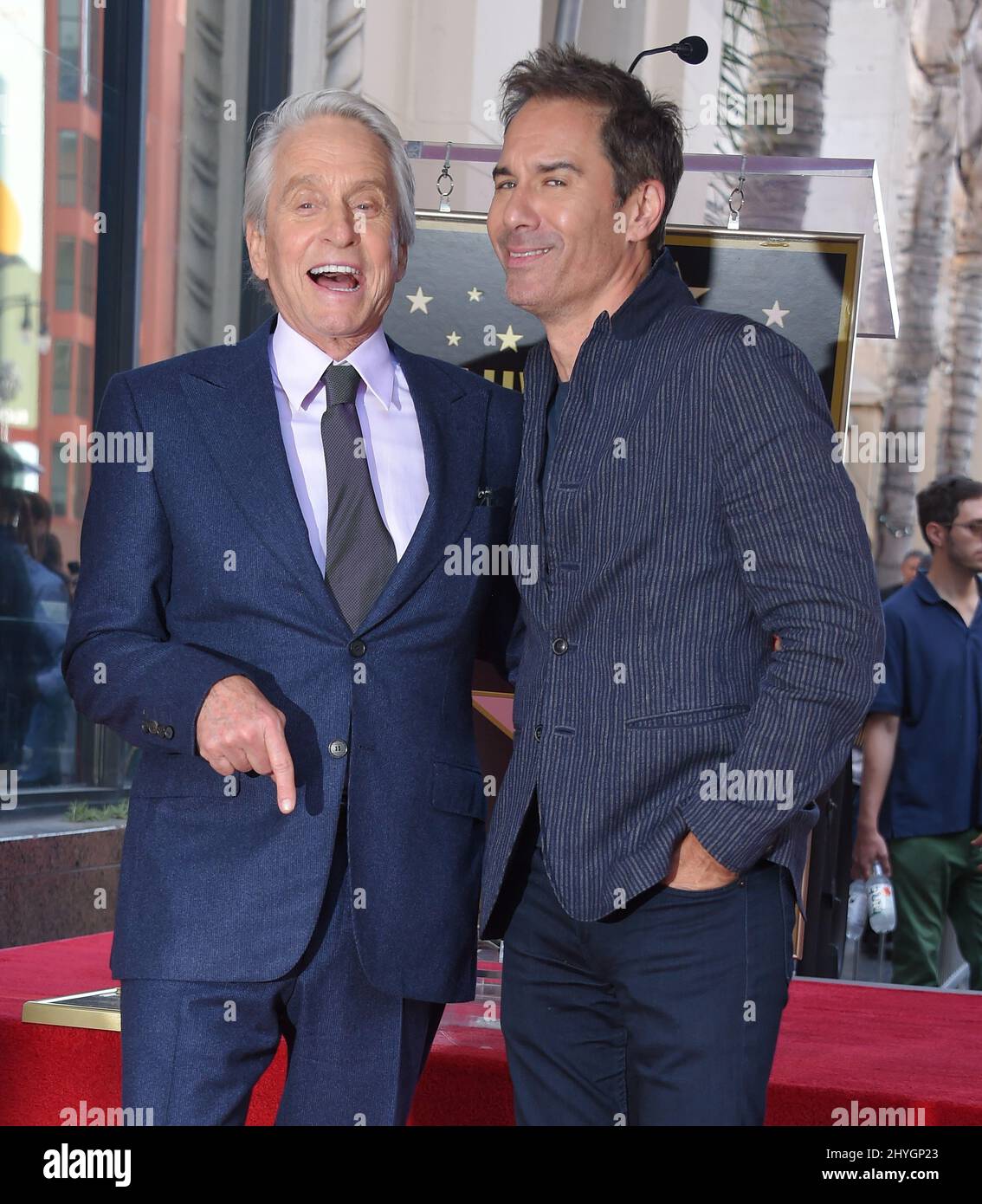Michael Douglas and Eric McCormack at the Walk of Fame ceremony ...