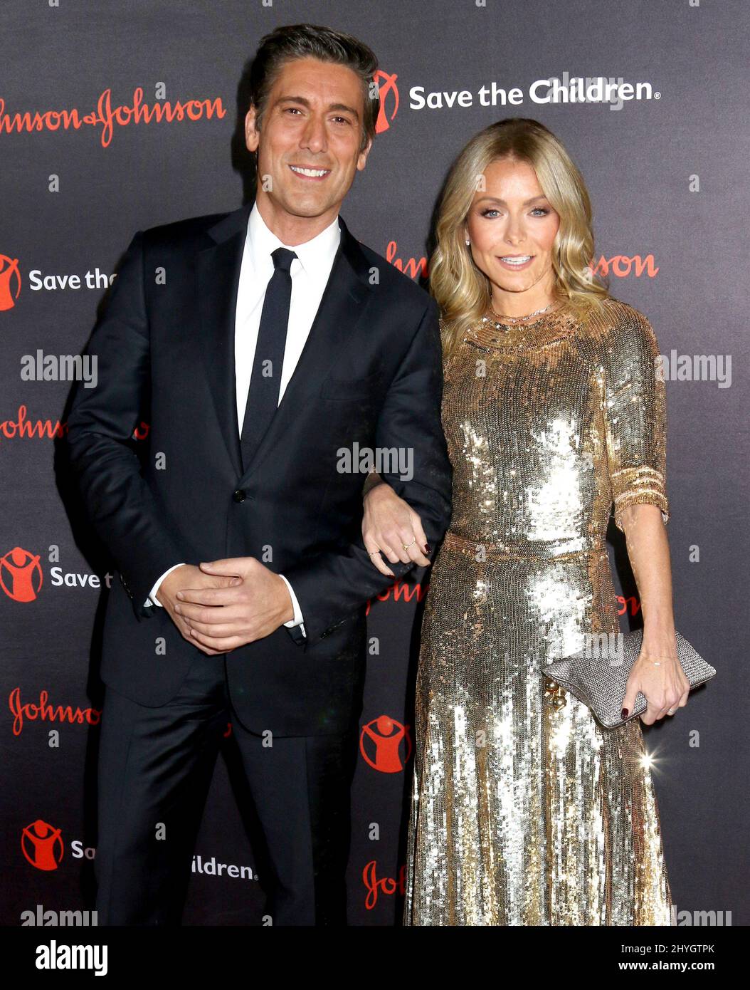 David Muir & Kelly Ripa at the Save the Children Illumination Gala held ...