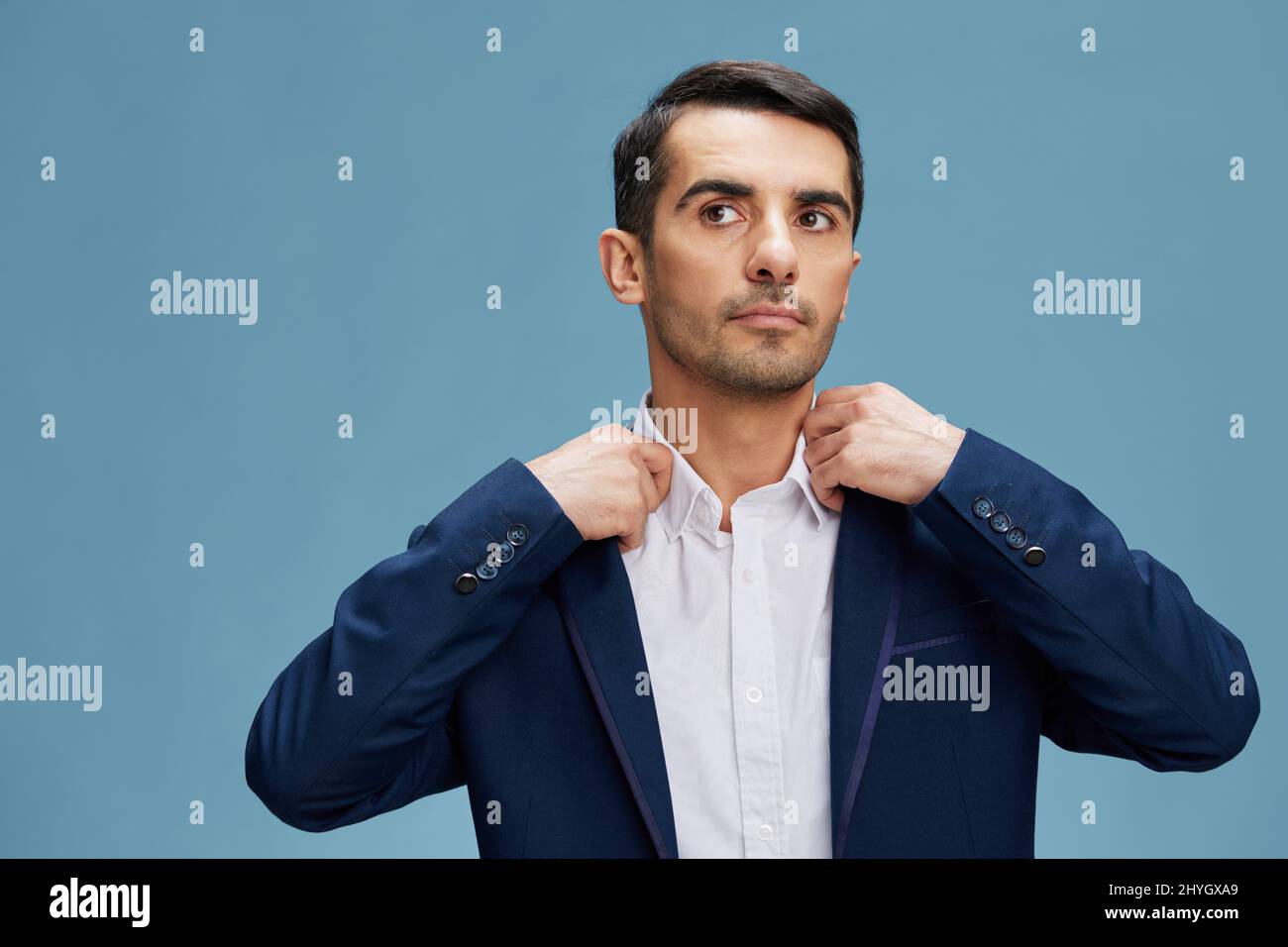 man adjusting blue business jacket marketing manager workspace blue ...