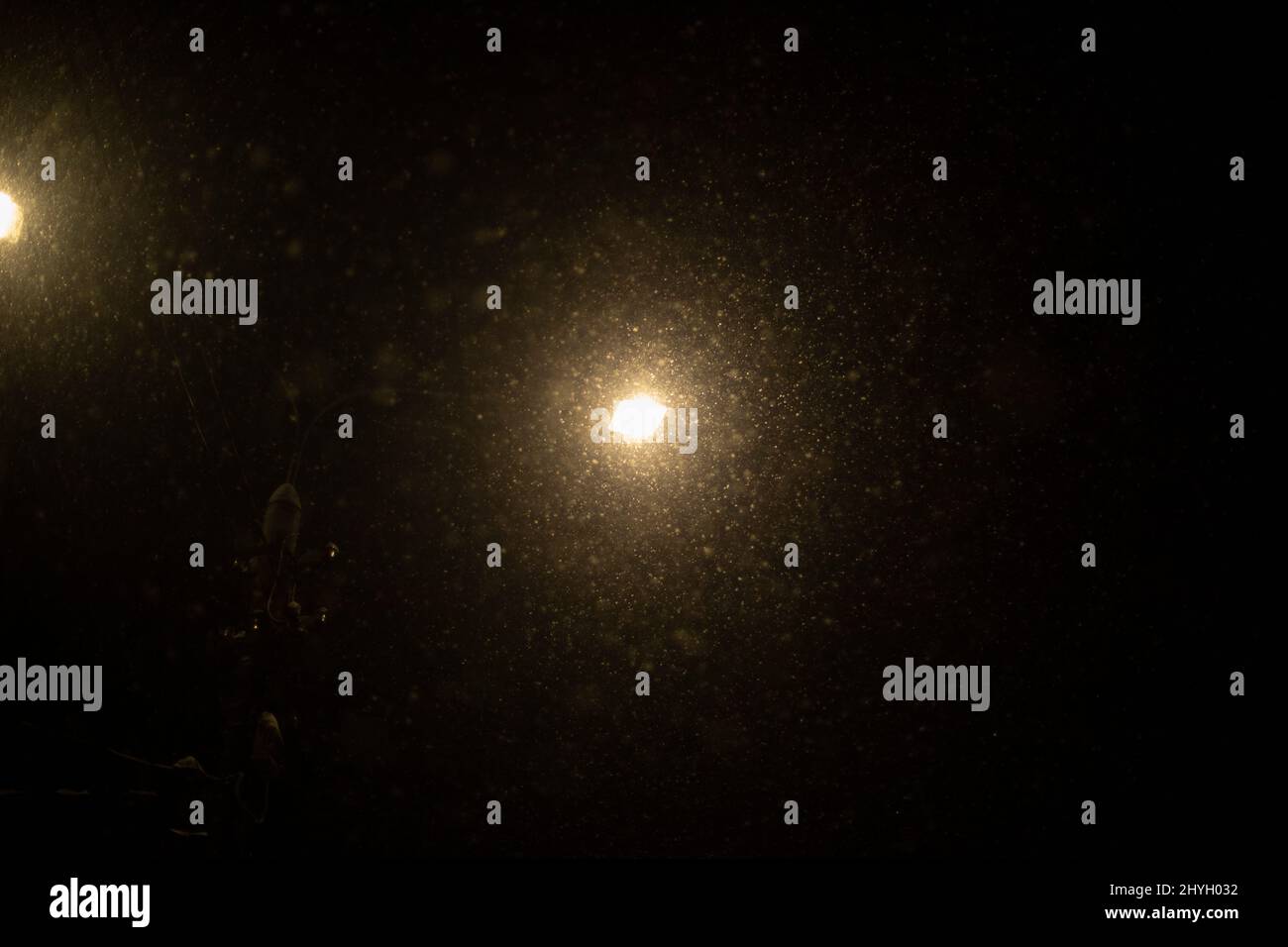 Snow at night. Blizzard in city. Light of lamp on background of ...