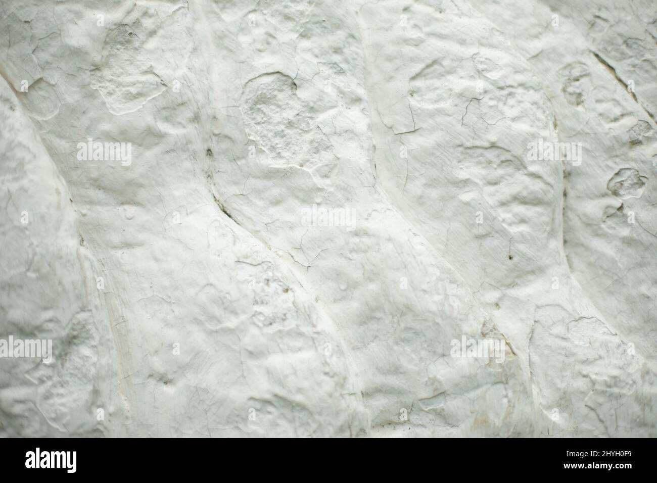 Texture is white. Details of sculpture. Whitewashed surface. Background ...