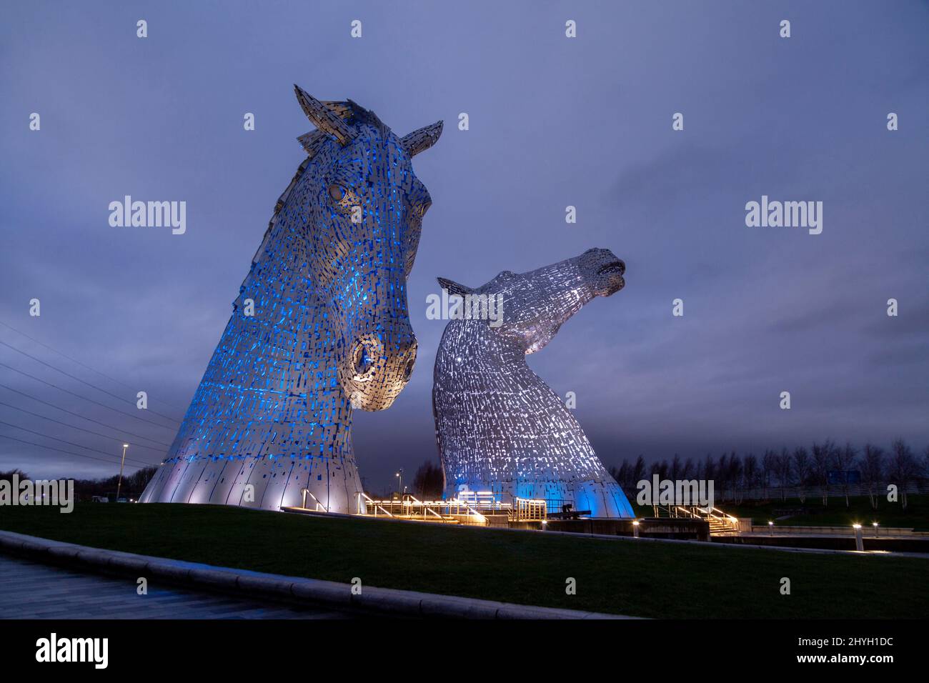 The Kelpies, giant horse head sculptures, at night Stock Photo - Alamy