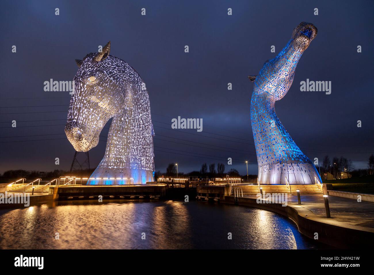 The Kelpies, giant horse head sculptures, at night Stock Photo - Alamy