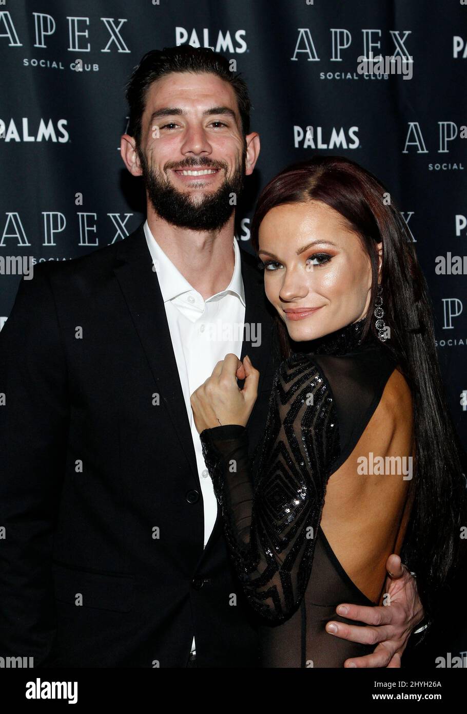 Steven Duncan, Caitlin O'Connor attending New Year's Eve at APEX Social ...