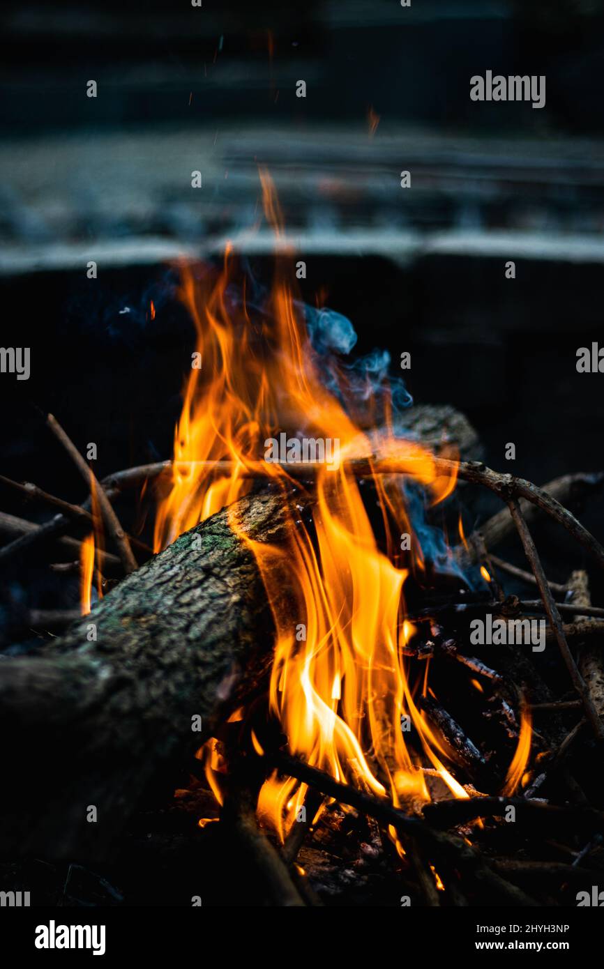 Campfire burning in evening close hi-res stock photography and images ...