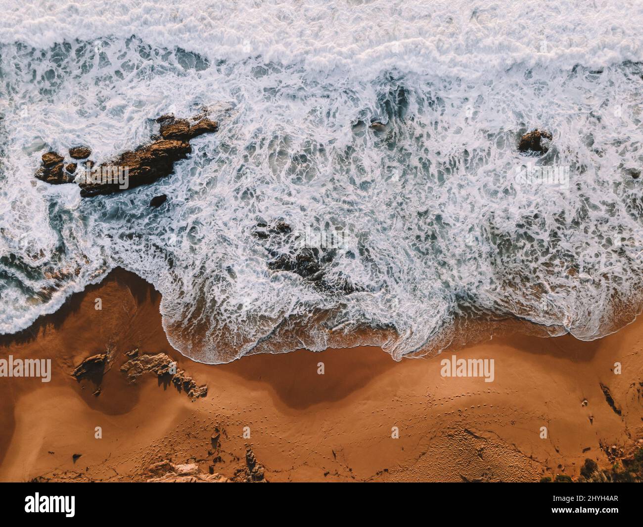 Top view of the beautiful Eden beach in Australia with foamy waves ...