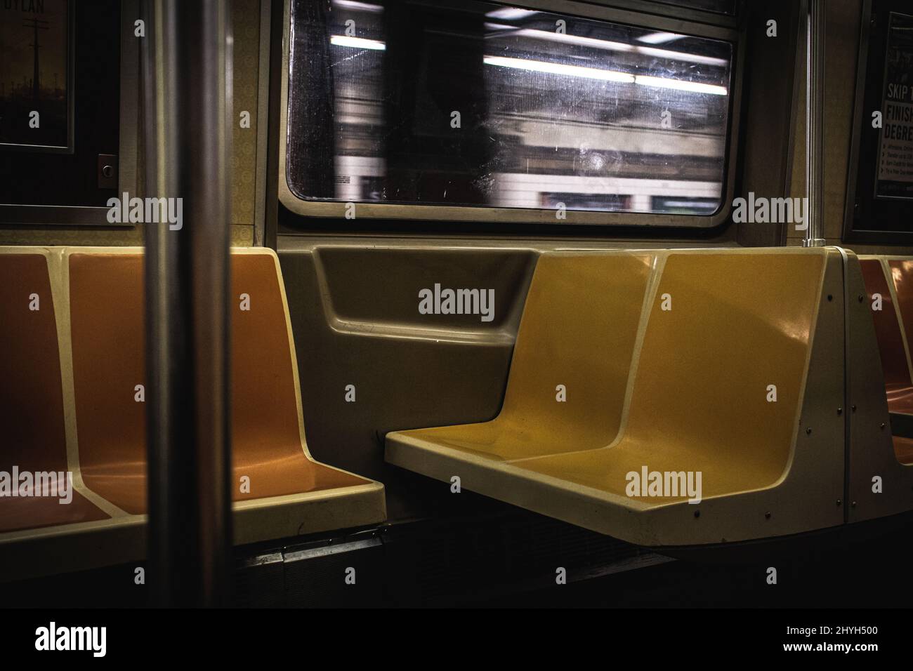Colorful seats inside a subway Stock Photo - Alamy