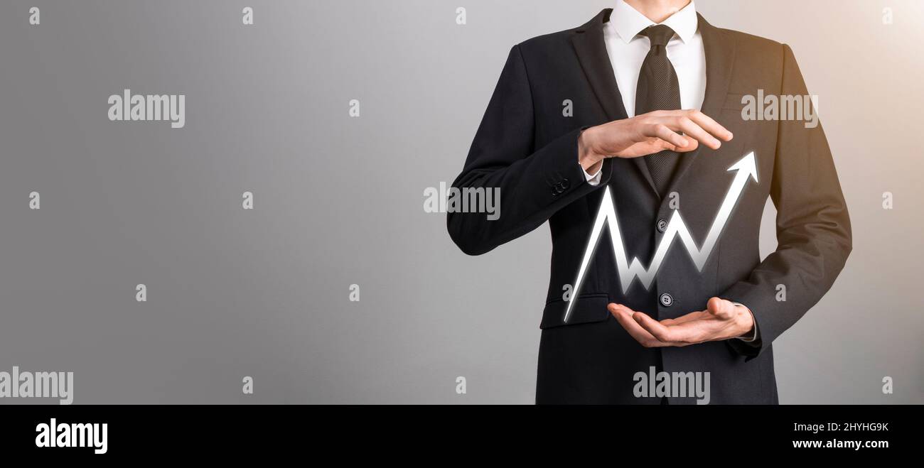 Businessman hold drawing on screen growing graph, arrow of positive ...
