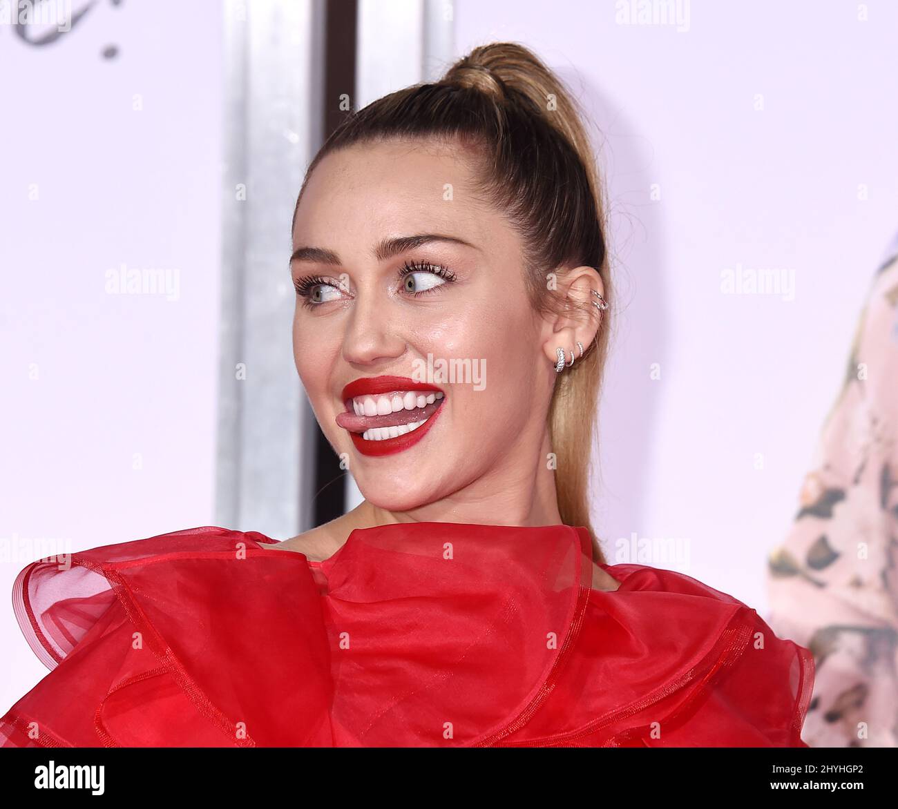 Miley Cyrus at the "Isn't It Romantic" world premiere held at The ...