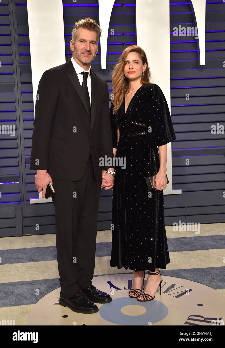 Amanda Peete and David Benioff attending the 2019 Vanity Fair Oscar ...
