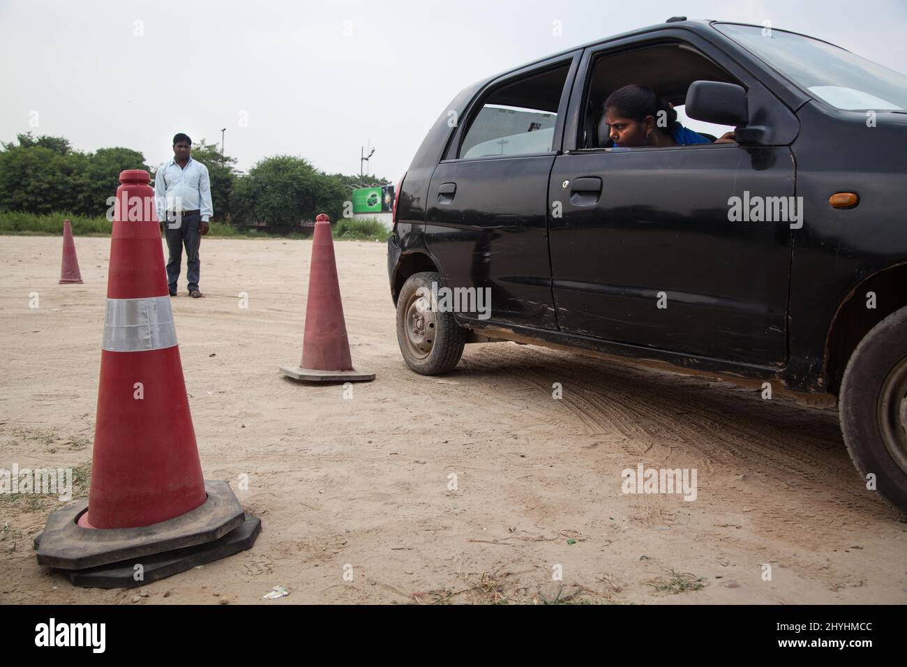 Delhi, India. 14th Sep, 2016. A woman receives driving instruction as ...
