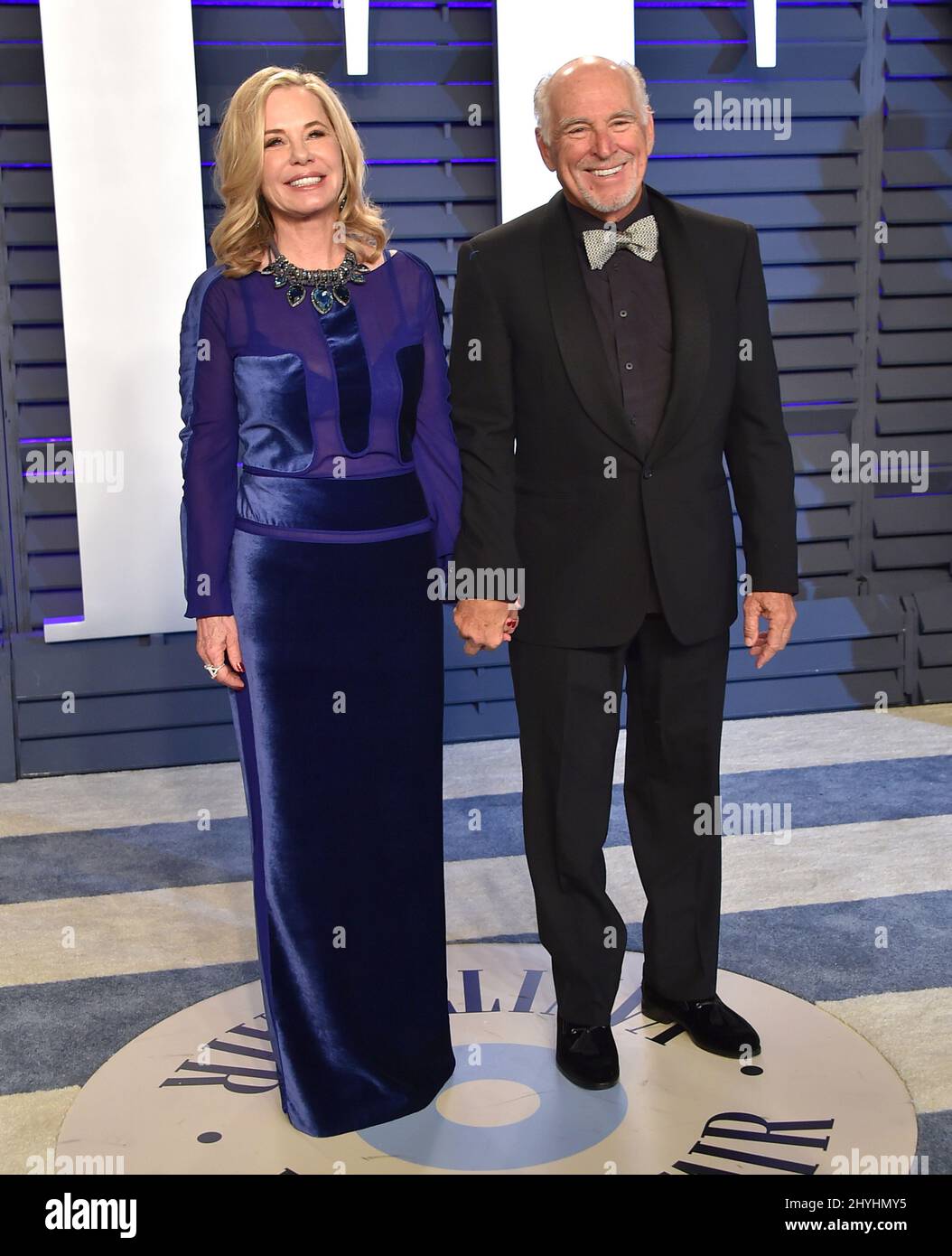Jimmy Buffett and Jane Slagsvol attending the 2019 Vanity Fair Oscar ...