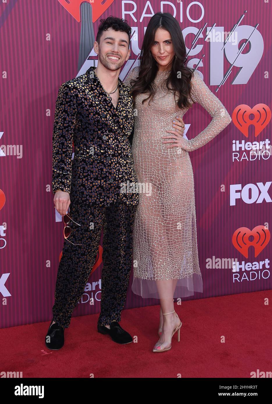 Max (left) arriving to the iHeart Radio Music Awards at Microsoft ...