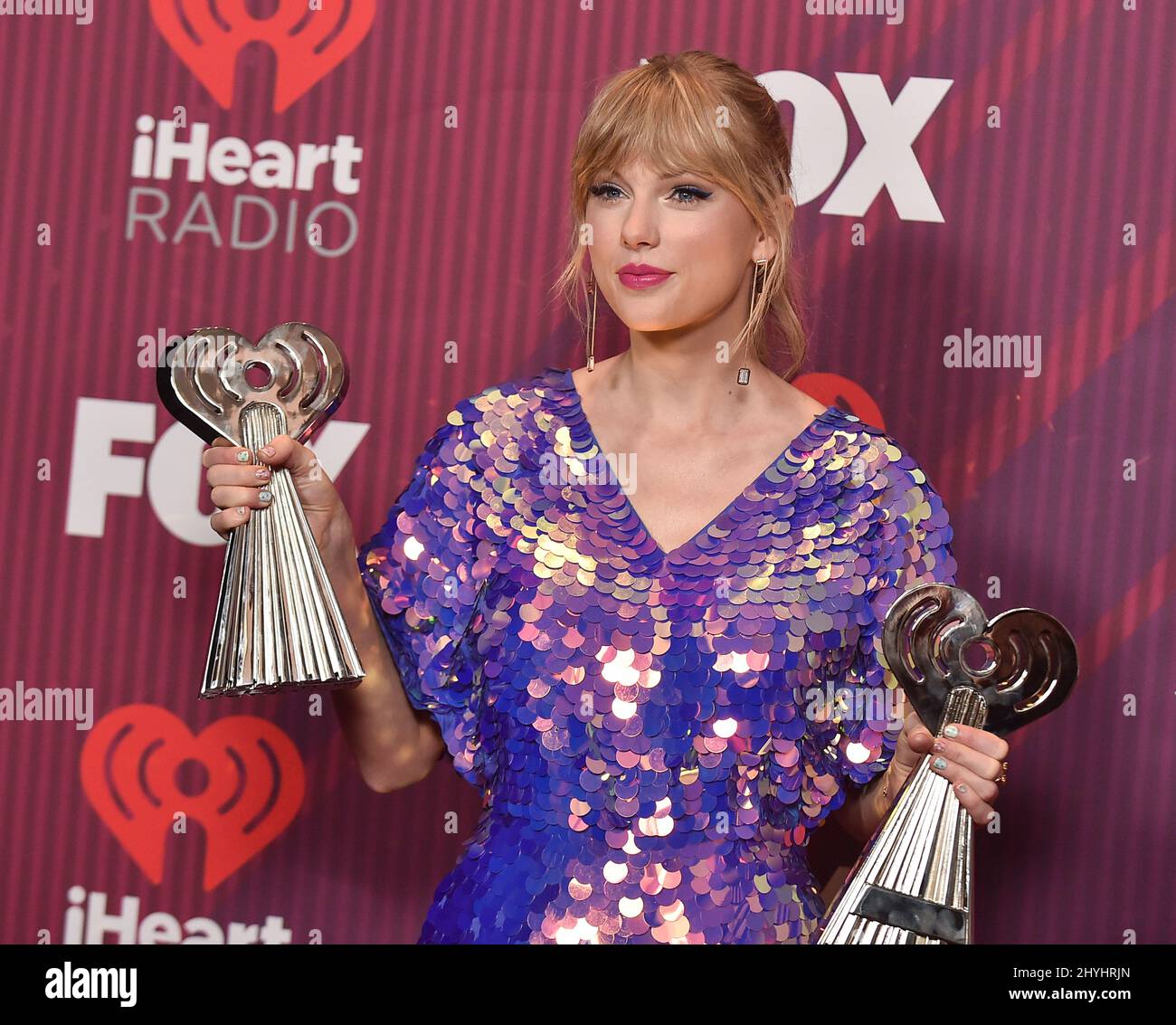 Taylor Swift in the press room at the iHeart Radio Music Awards at ...