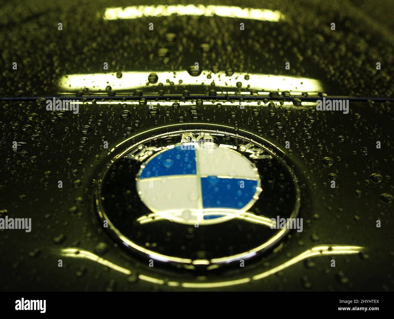 BMW logo on a car with water droplets on it Stock Photo - Alamy