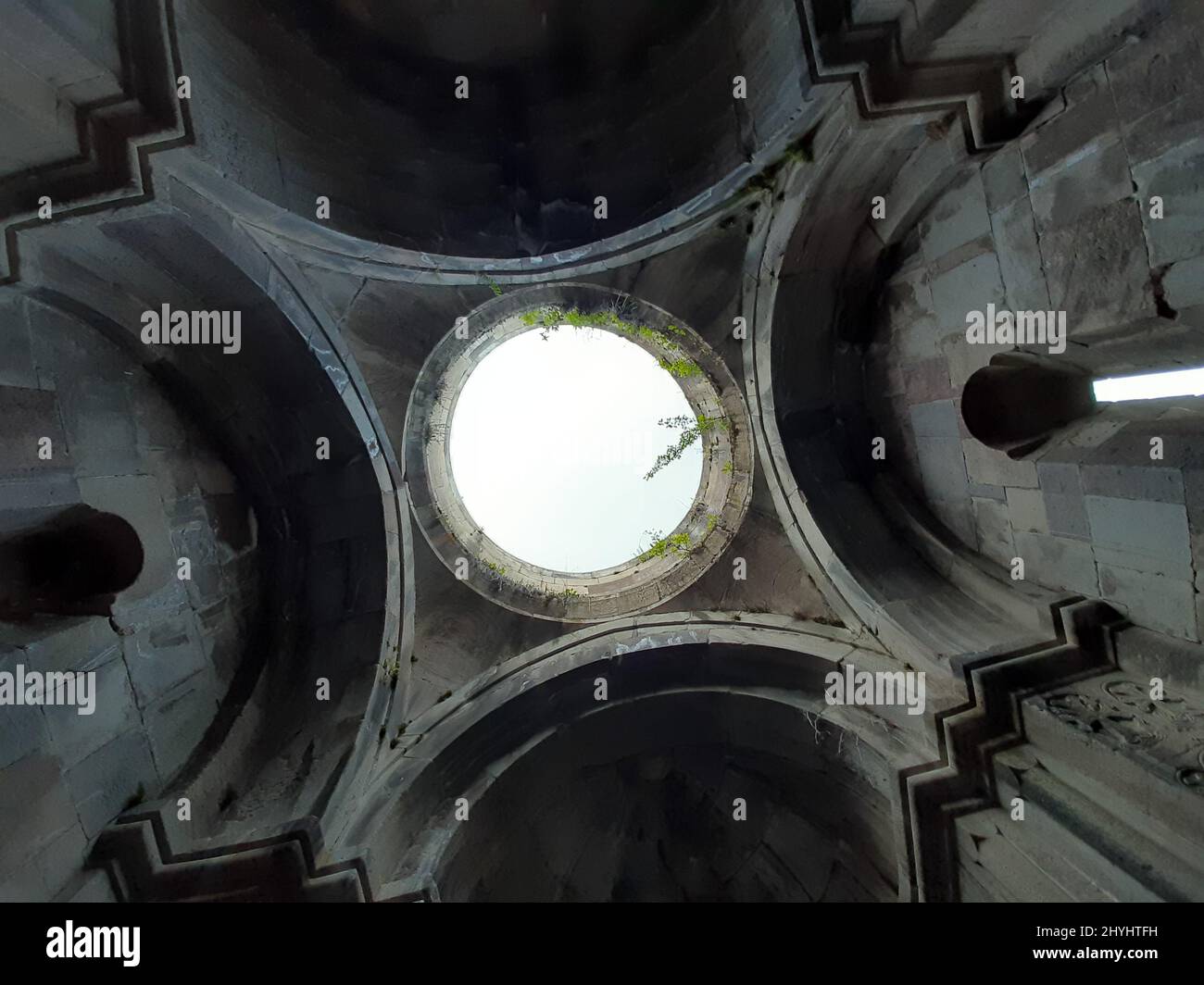 Low angle shot of the ceiling of ruins of an ancient Armenian monastery ...
