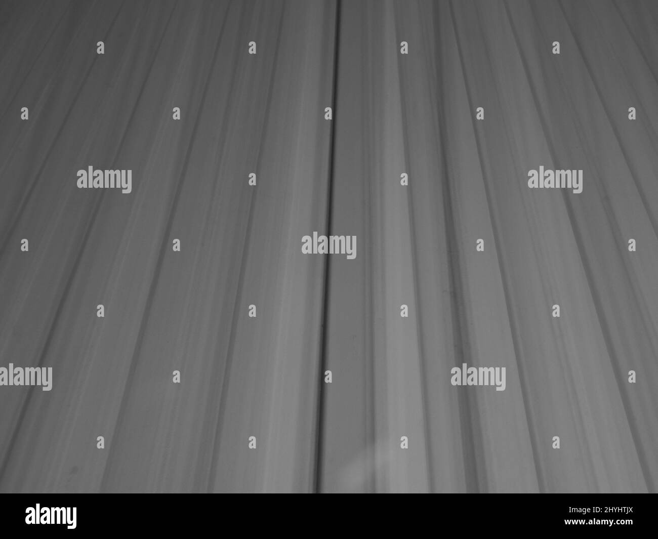 Abstract lines background. Blurry moving white lines converging on the ...